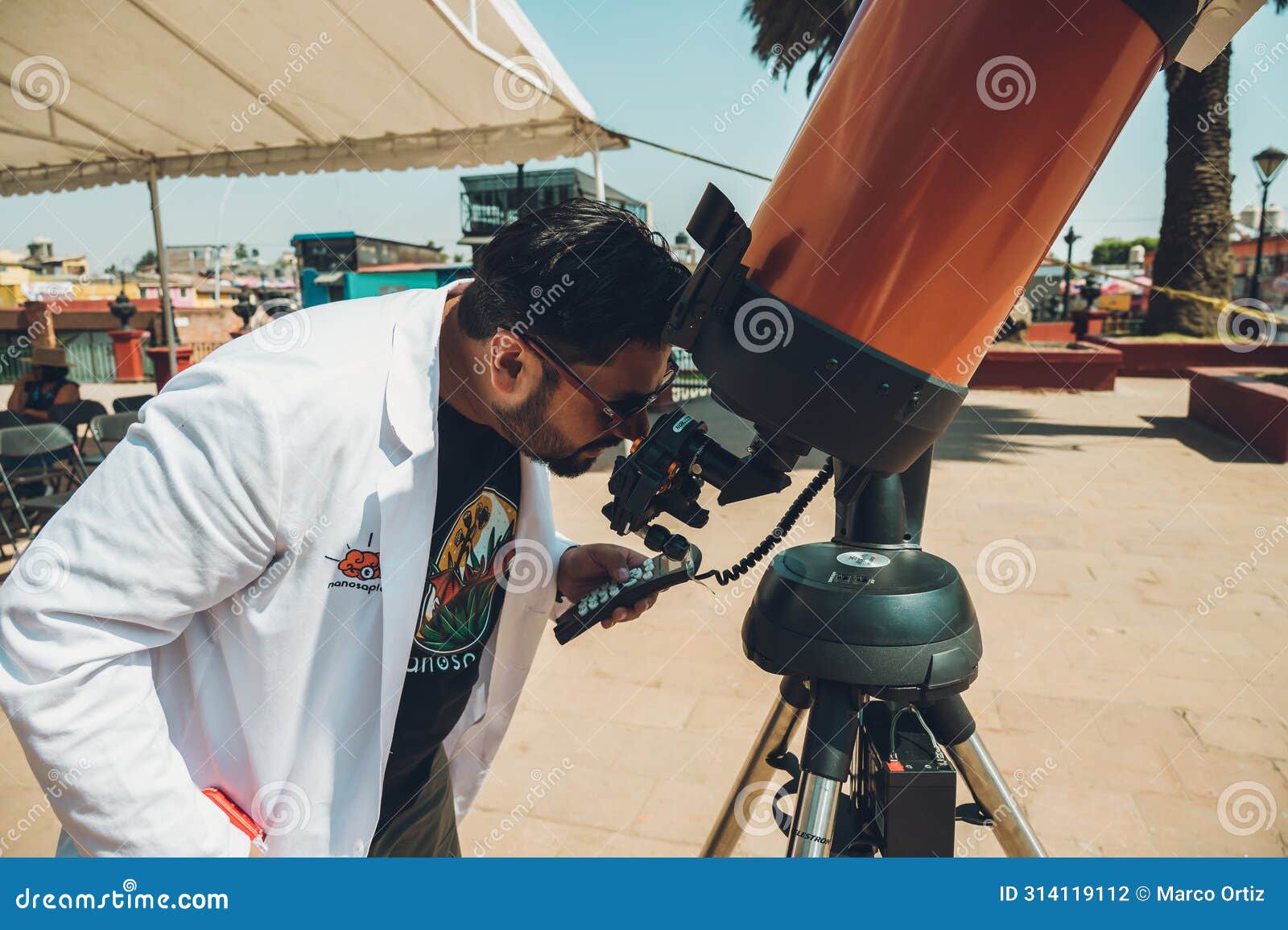 Scientist Arranging His Telescope To Observe the 2024 Annular Solar ...