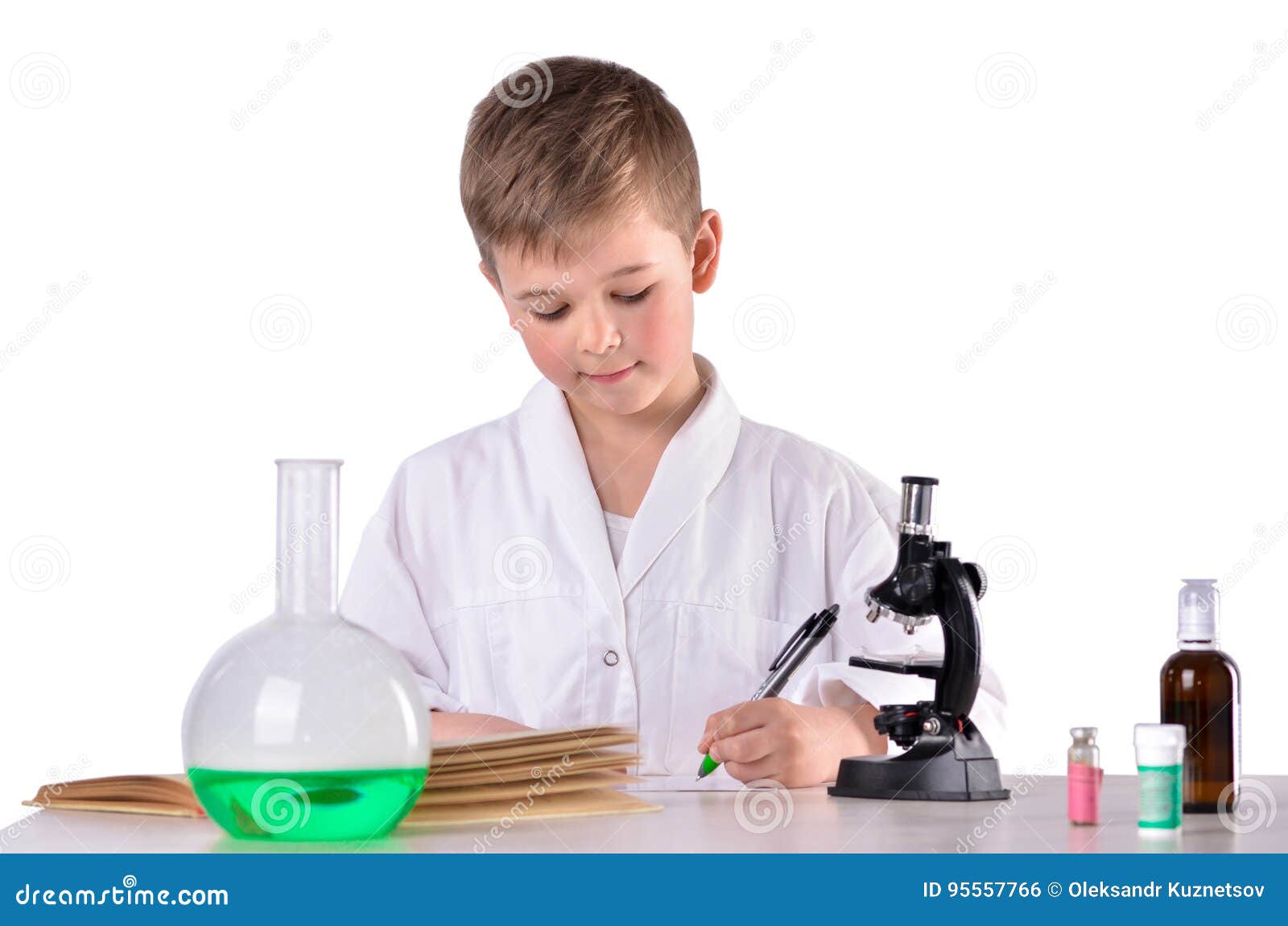 Scientist Boy in the Chemistry Lab Write with a Pen Stock Photo - Image ...