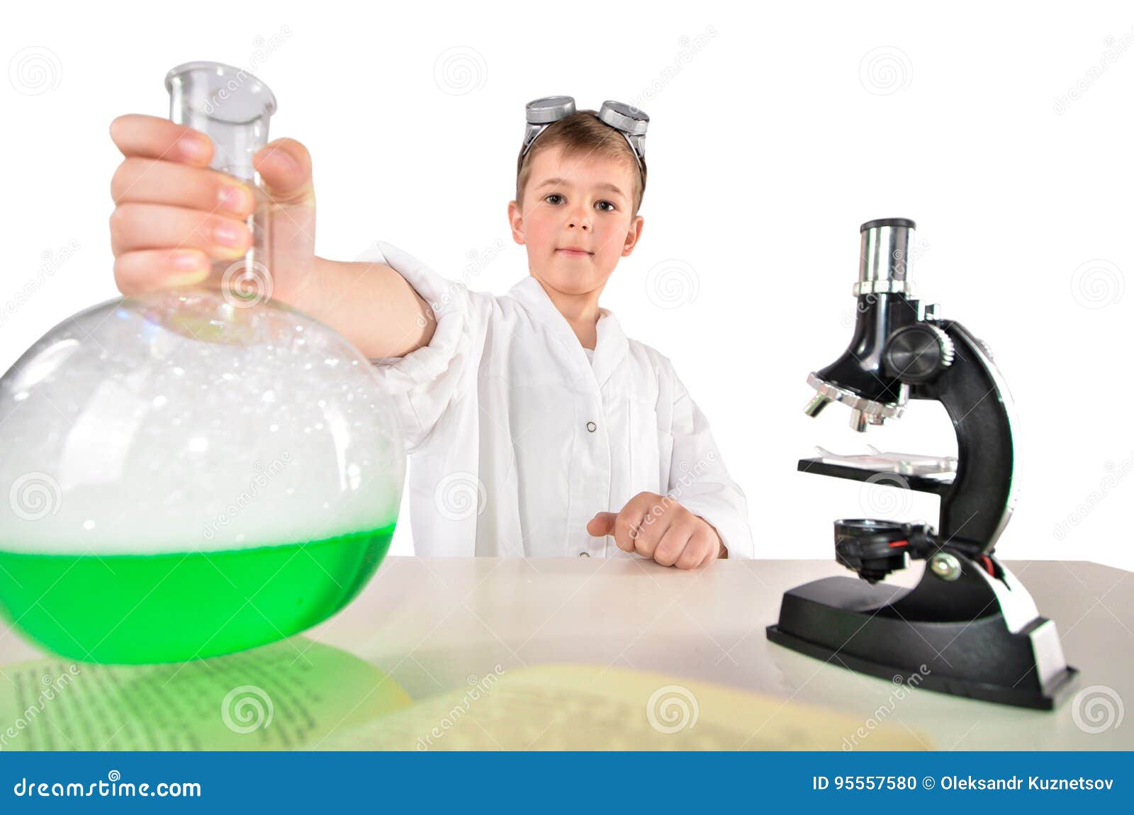 Scientist Boy Holds in His Hand a Big Flask with Green Foaming Liquid ...