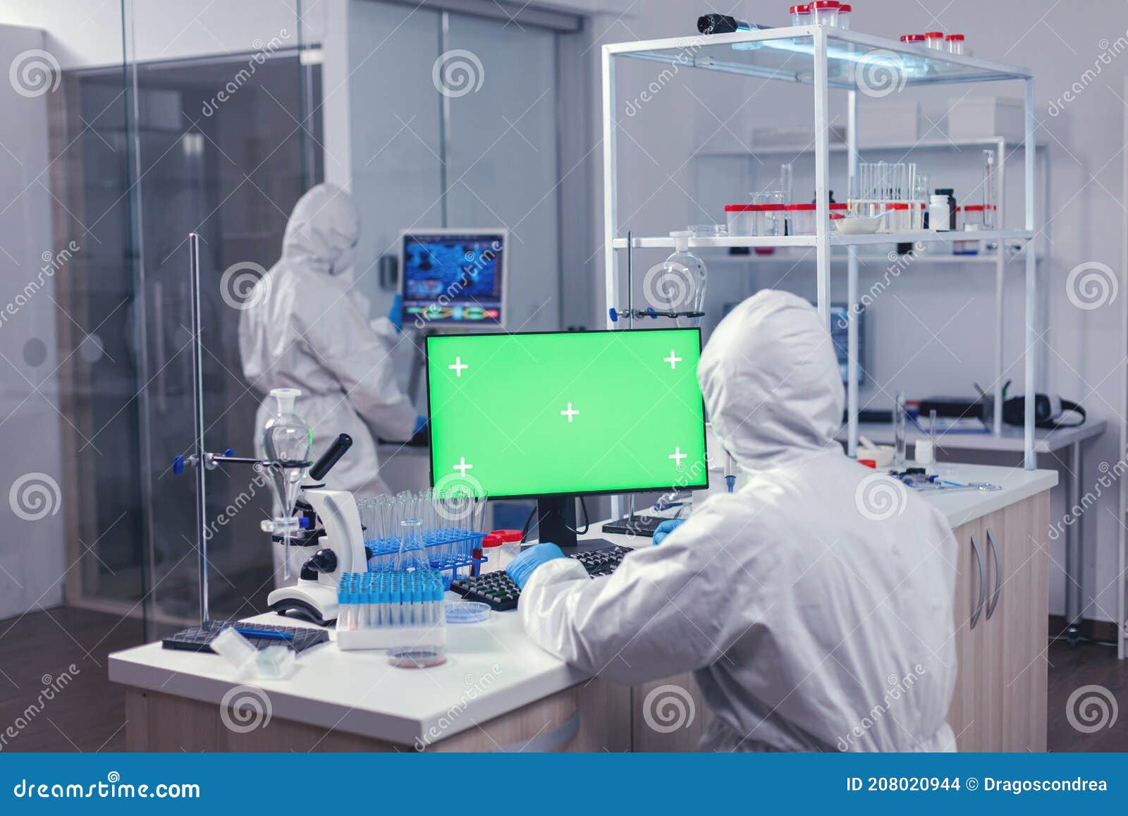 Scientist Conducting Experiment Using Computer with Green Screen Stock ...