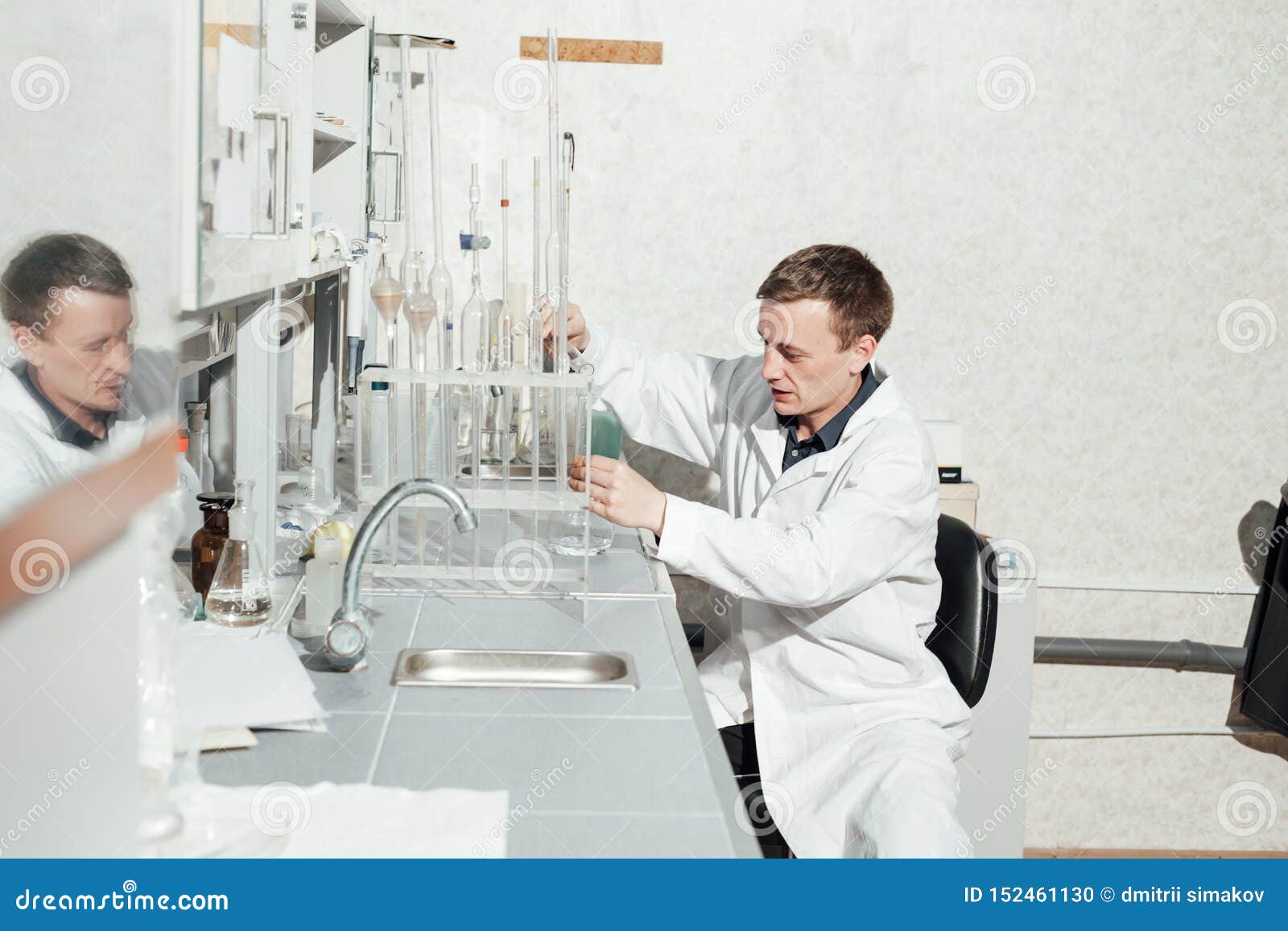 Scientist Conducts Chemical Experiments in the Laboratory Stock Photo ...