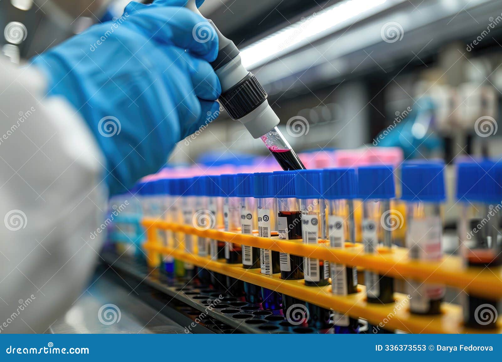 Scientist Conducts Laboratory Testing with Pipette in Modern Research ...