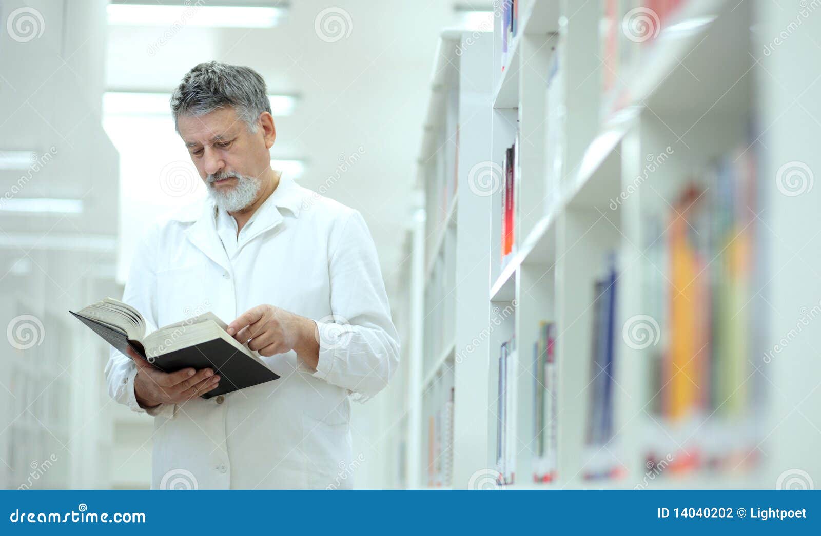 Scientist/doctor in a Library Stock Photo - Image of confident, person ...