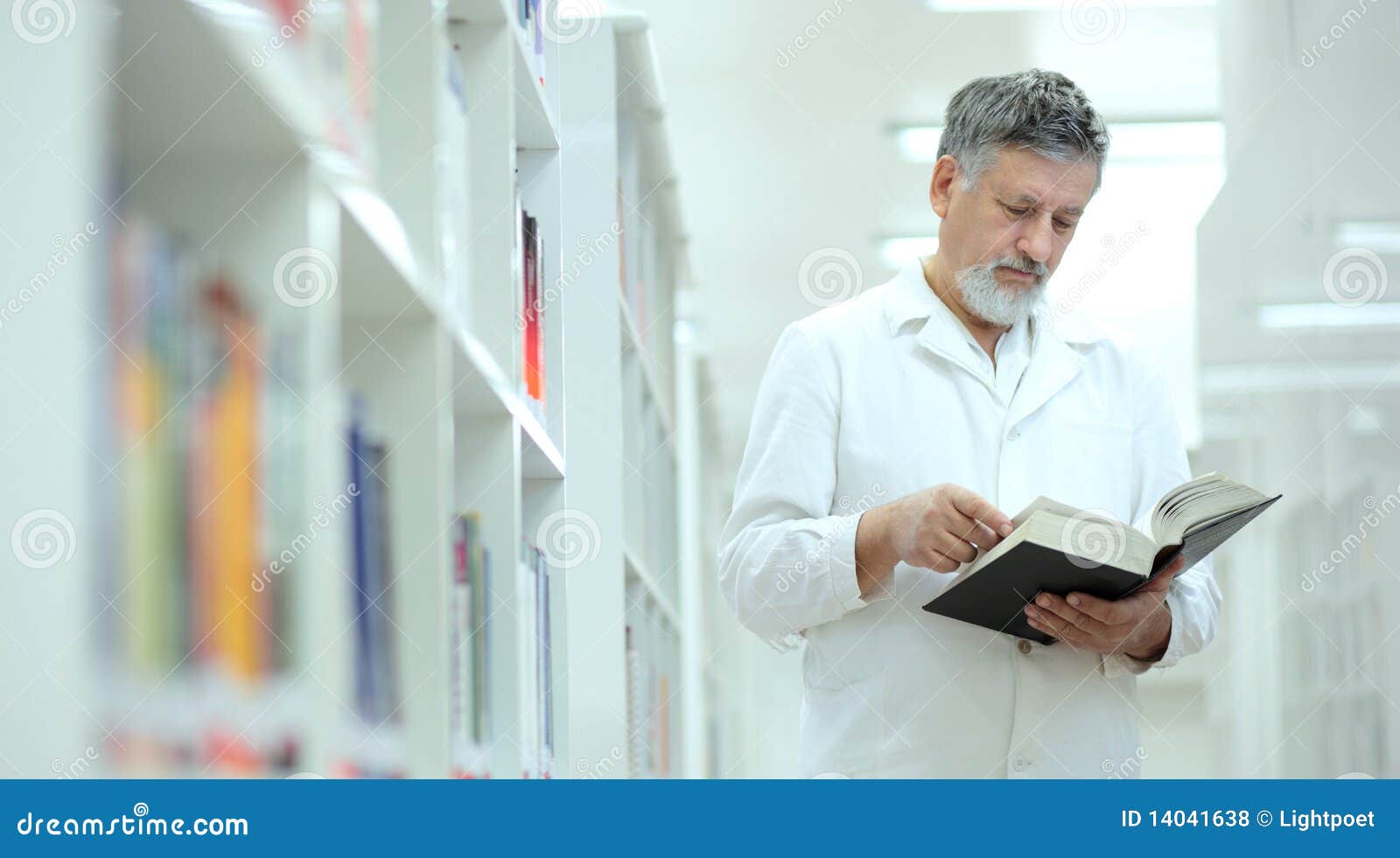 Scientist/doctor in a Library Stock Photo - Image of people, bookshelf ...