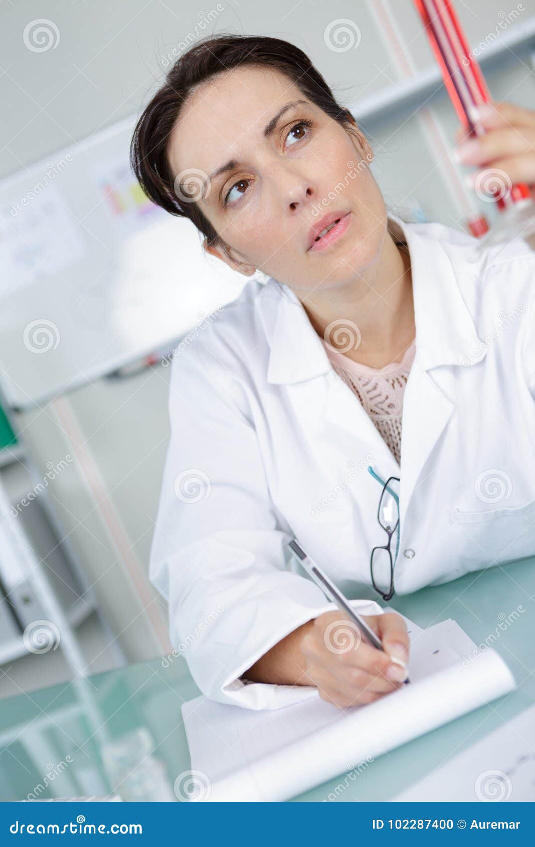 Scientist Documenting Observation on Liquid Stock Photo - Image of ...