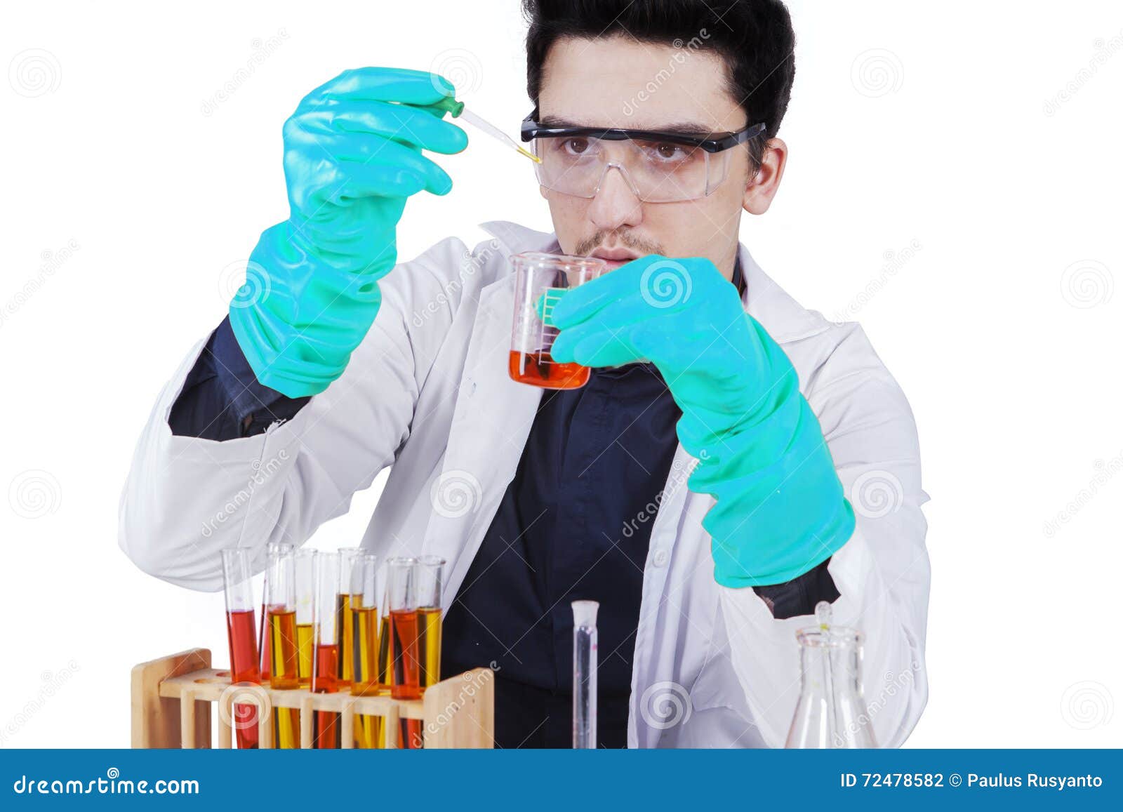 Scientist doing experiment stock photo. Image of liquid - 72478582