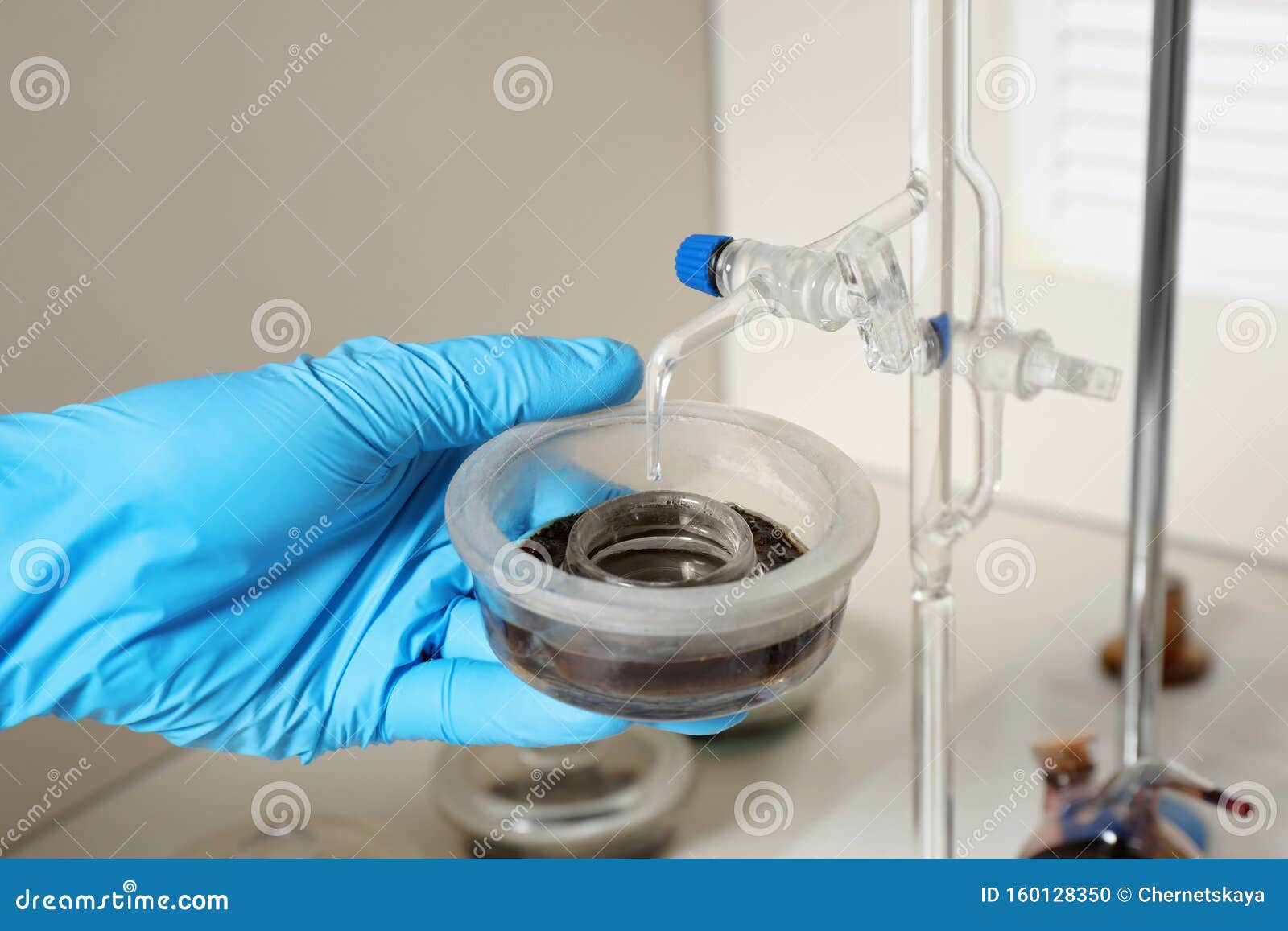 Scientist Doing Nitrogen Determination of Soil Sample at Table ...
