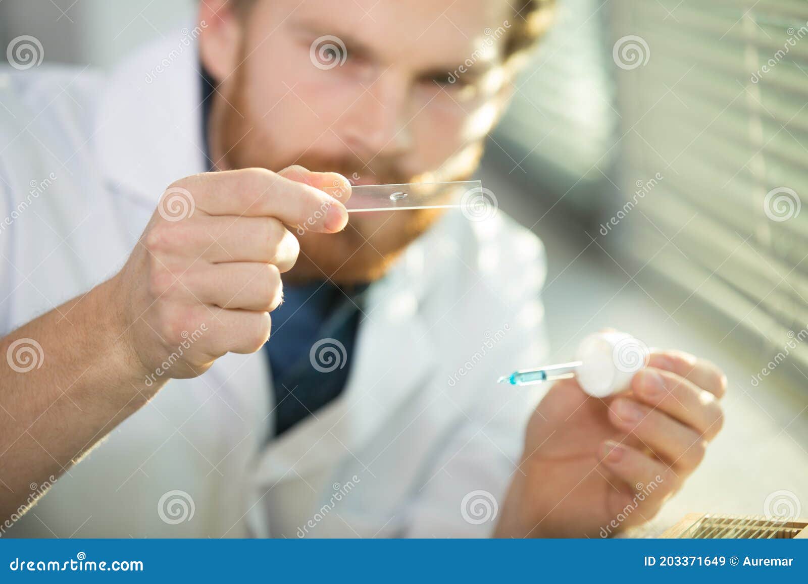 Scientist with Dropper and Microscope Slide Stock Image - Image of ...