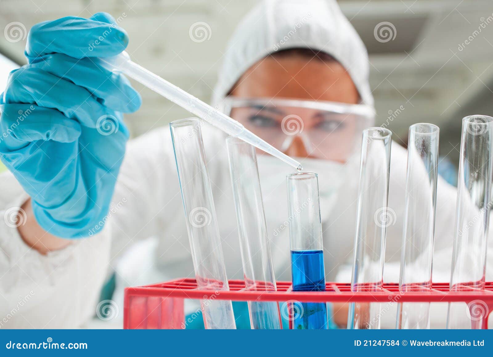 A Scientist Dropping Liquid in a Test Tube Stock Photo - Image of glass ...