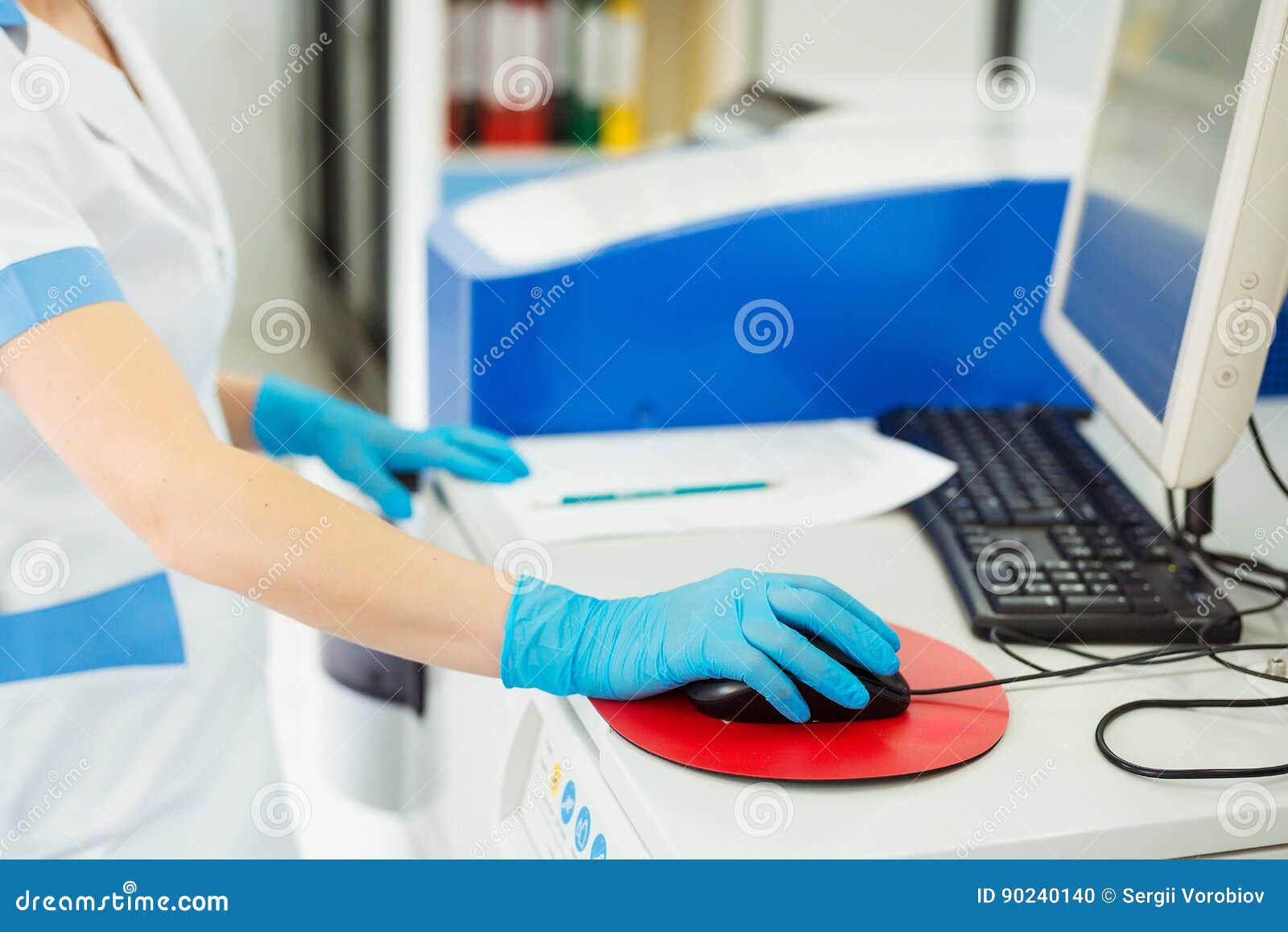 Scientist Entering Data of Blood Sample in Computer at Laboratory Stock ...