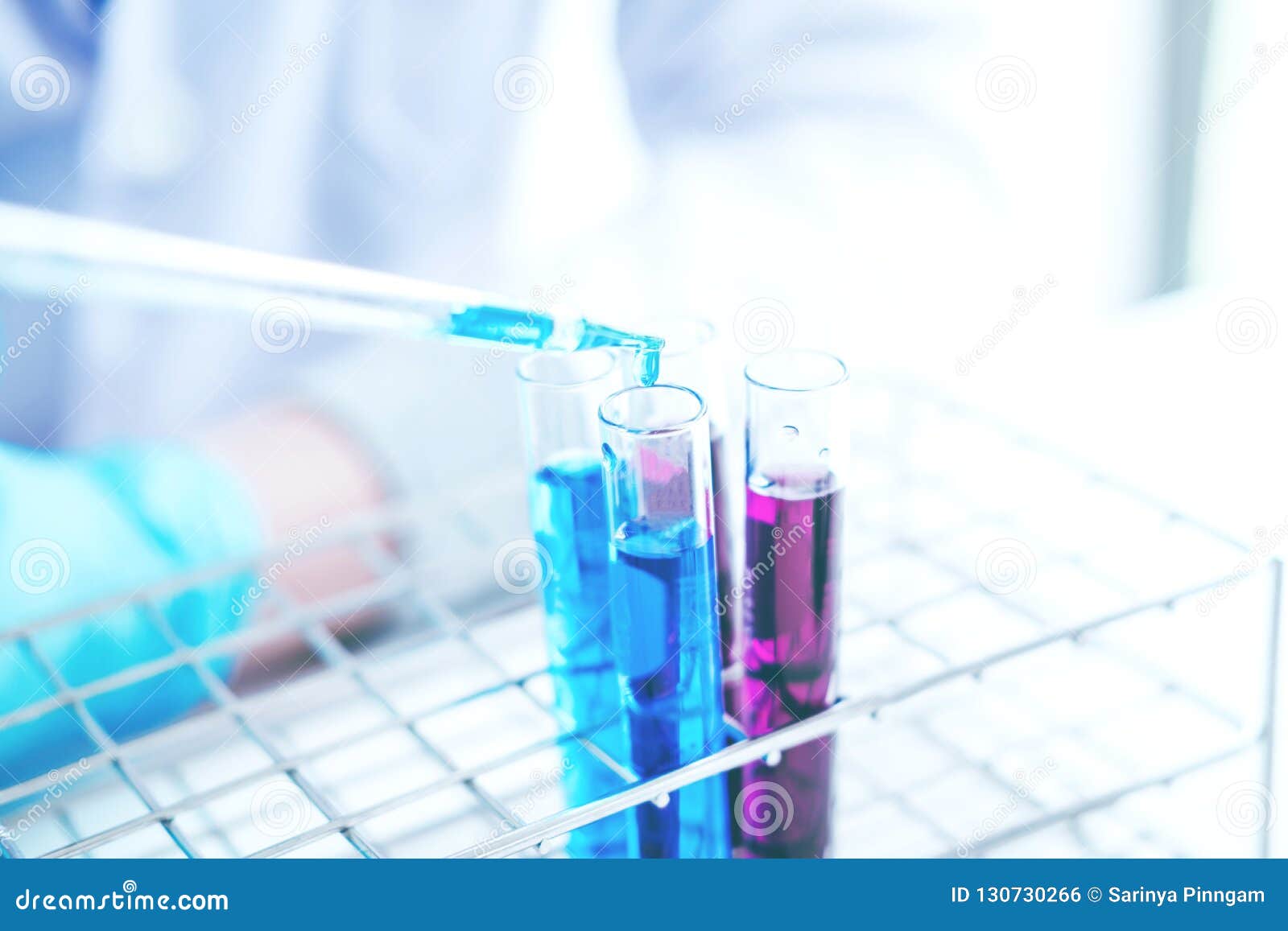 Scientist with Equipment Holding Tools during Scientific Experiment ...