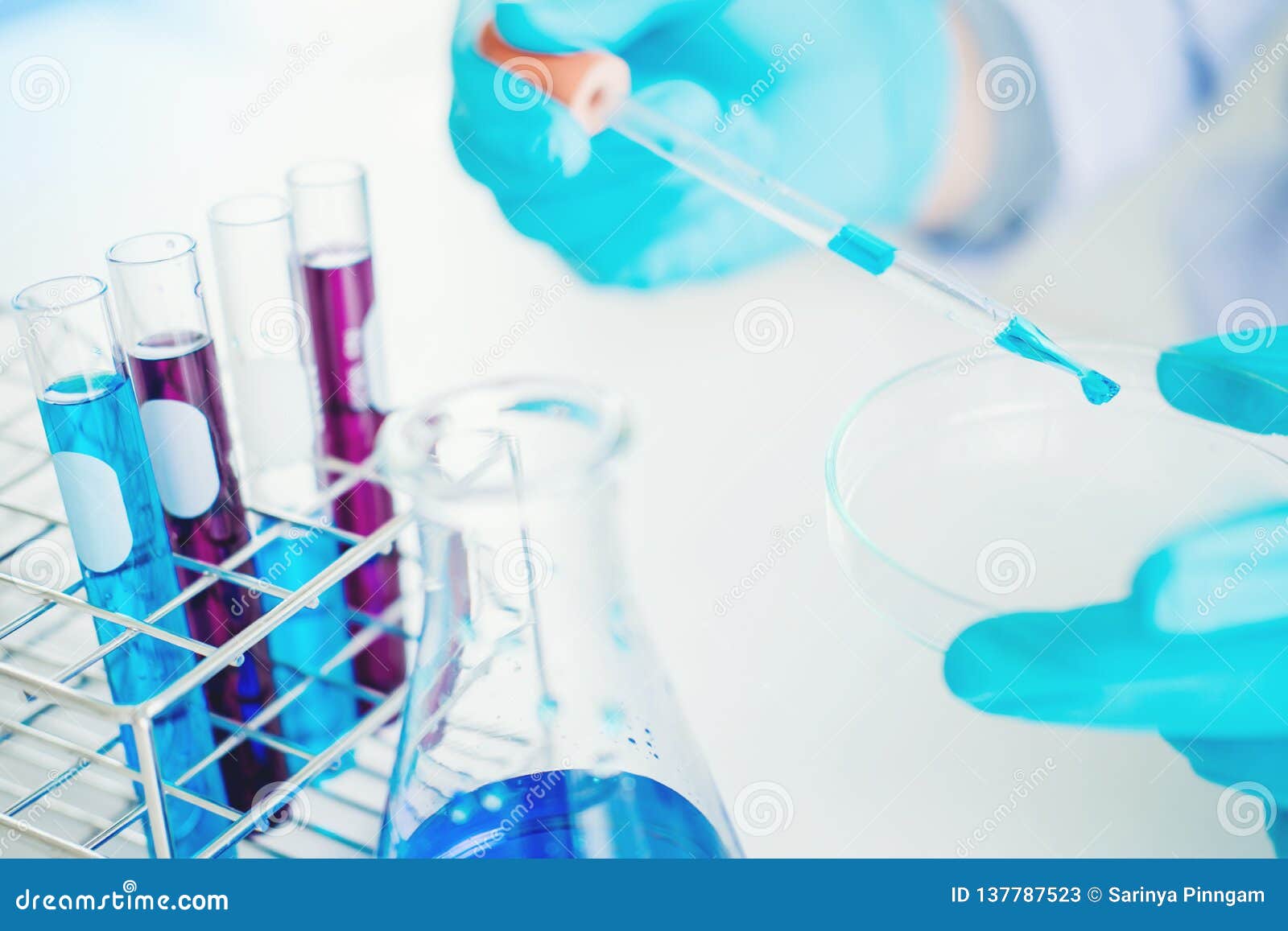 Scientist with Equipment Holding Tools during Scientific Experiment ...