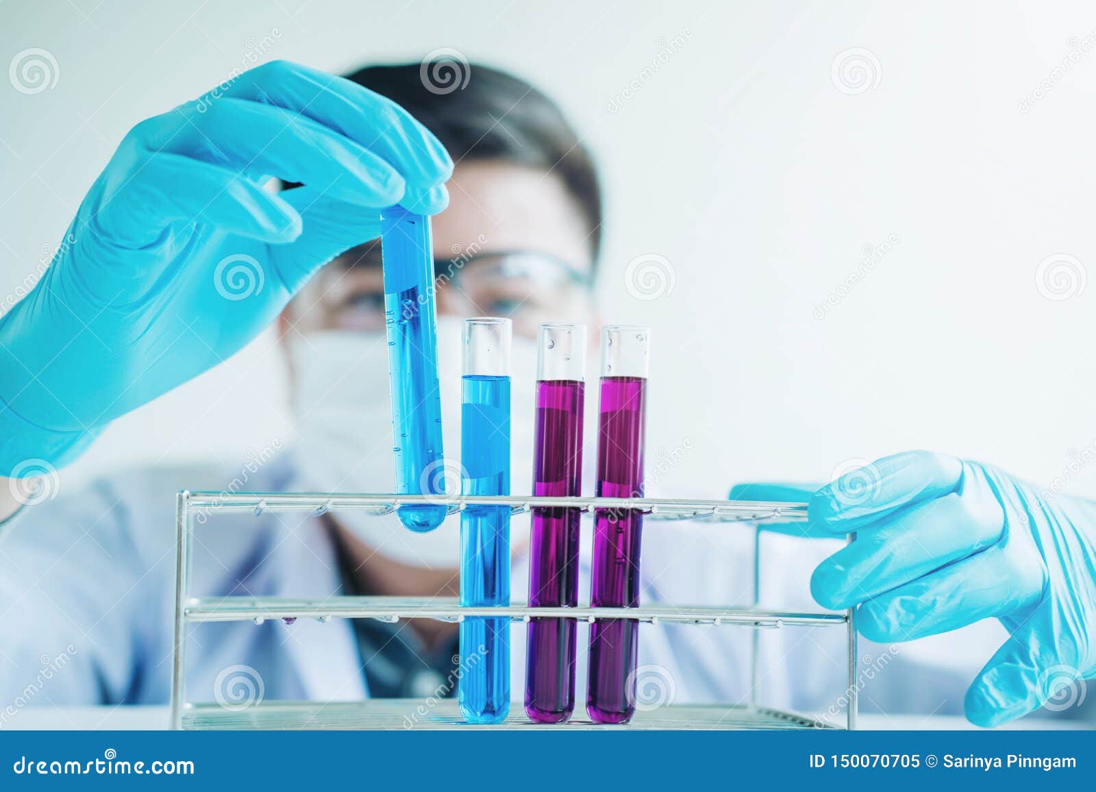 Scientist with Equipment Holding Tools during Scientific Experiment ...