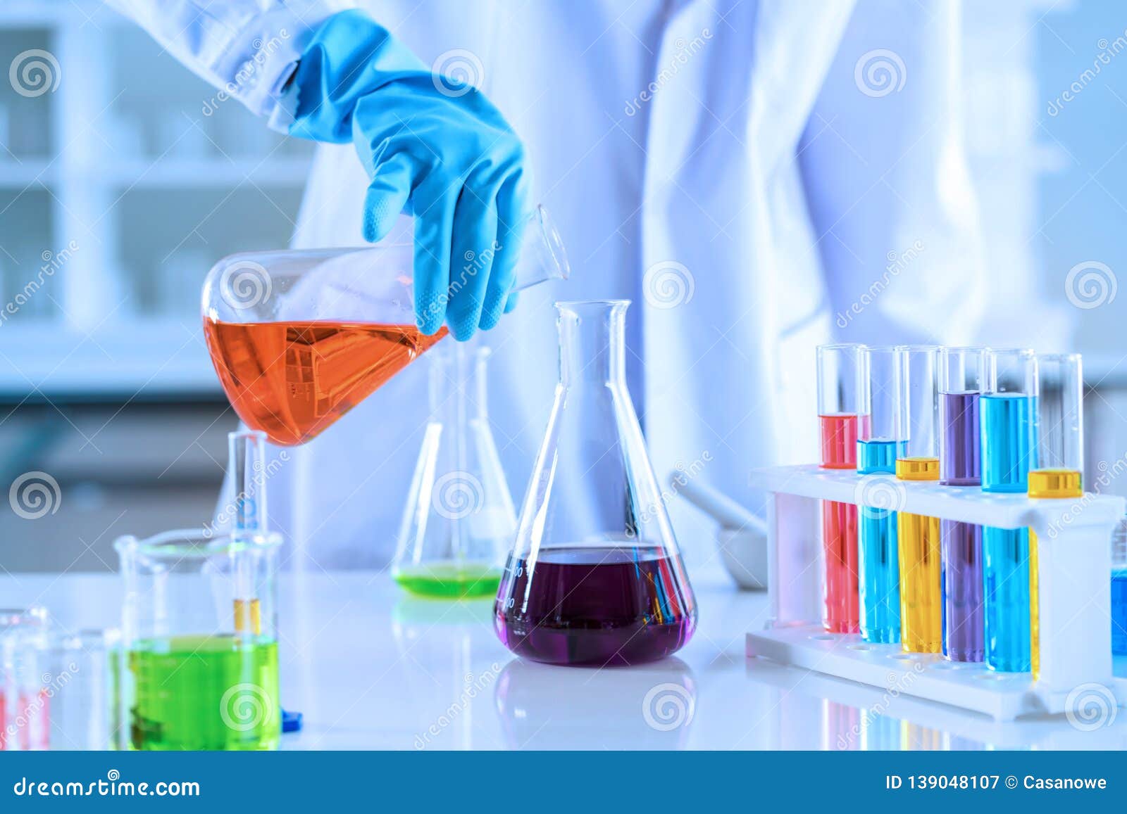 Scientist with Equipment and Science Experiments, Laboratory Glassware ...