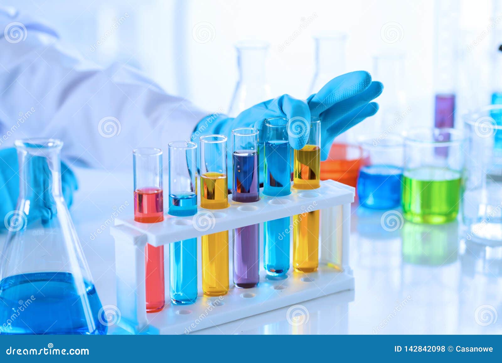 Scientist with Equipment and Science Experiments, Laboratory Glassware ...