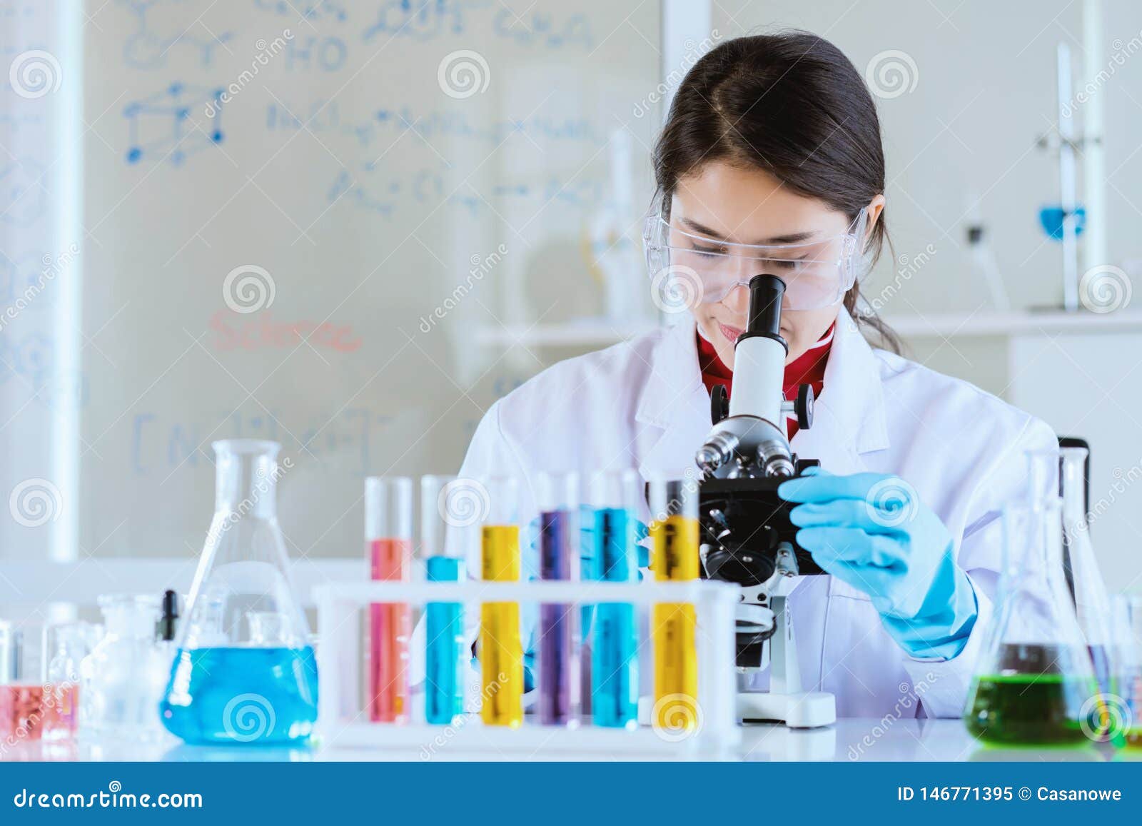 Scientist with Equipment and Science Experiments, Laboratory Glassware ...