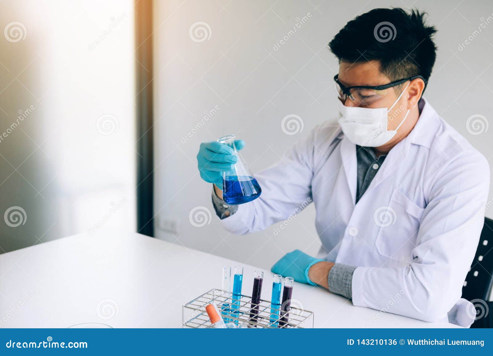Scientist with Equipment and Science Experiments in Laboratory Stock ...