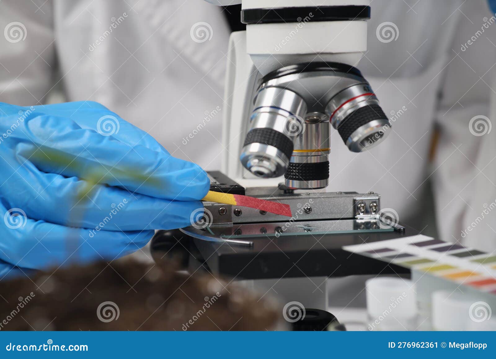 Worker In Rubber Boots Stands In Uncluttered Cement And Leveling Stock ...