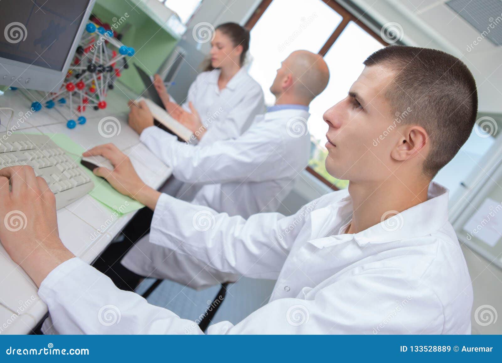 Scientist Examining Dna Model In Laboratory Stock Image Image Of