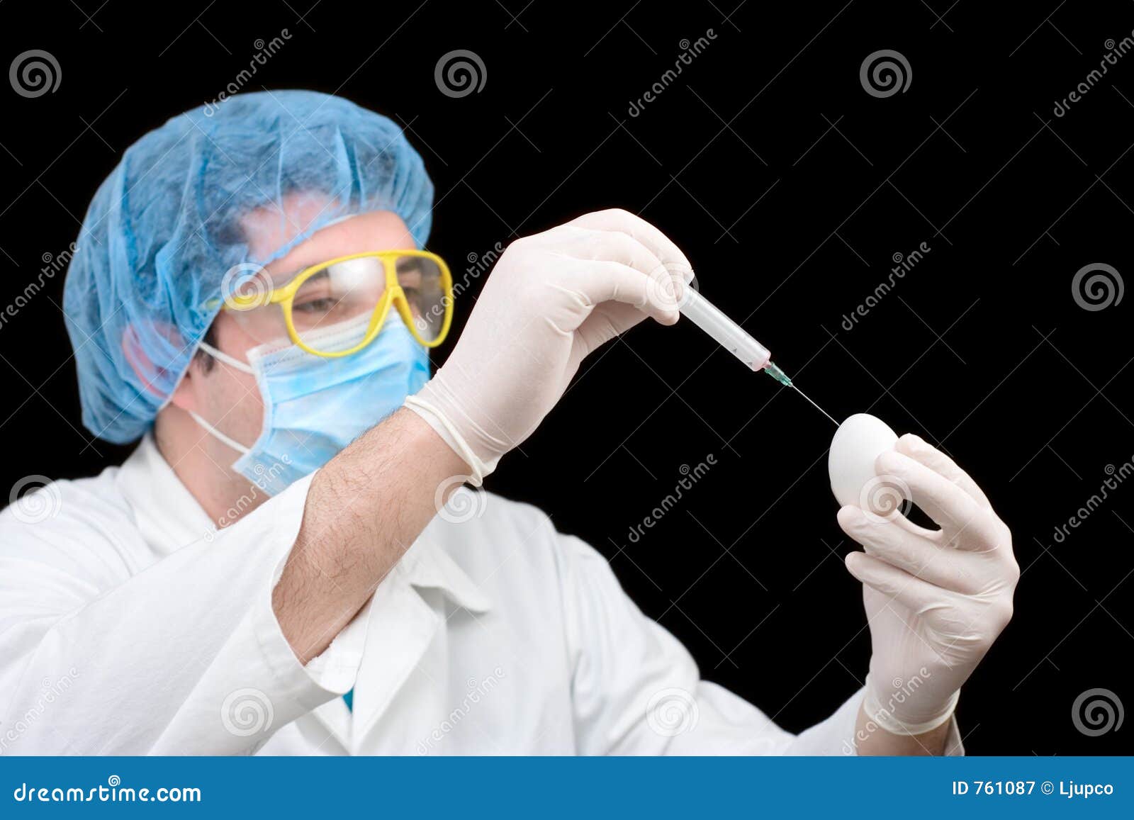 Scientist examining an egg stock image. Image of plastic - 761087