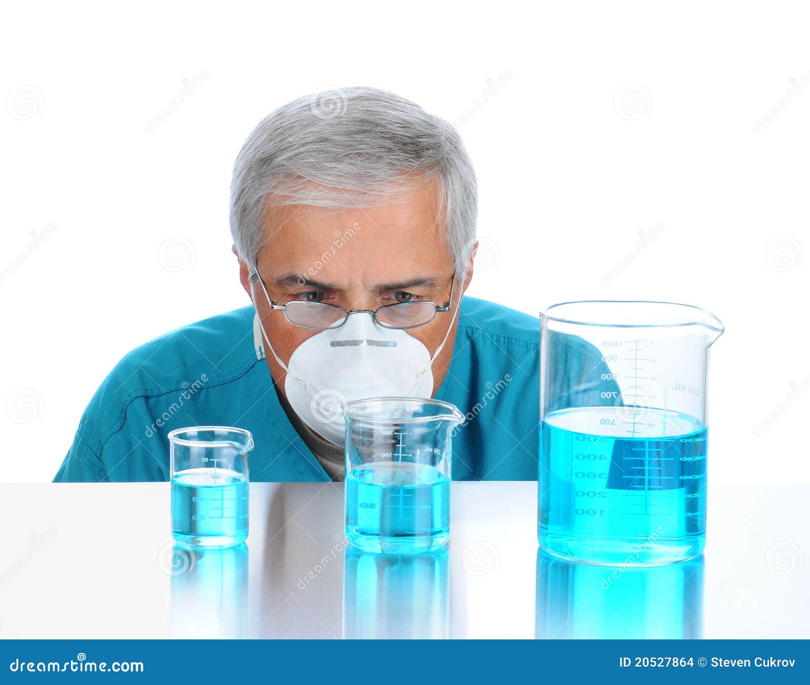 Scientist Examining Liquid in Beakers Stock Photo - Image of chemicals ...