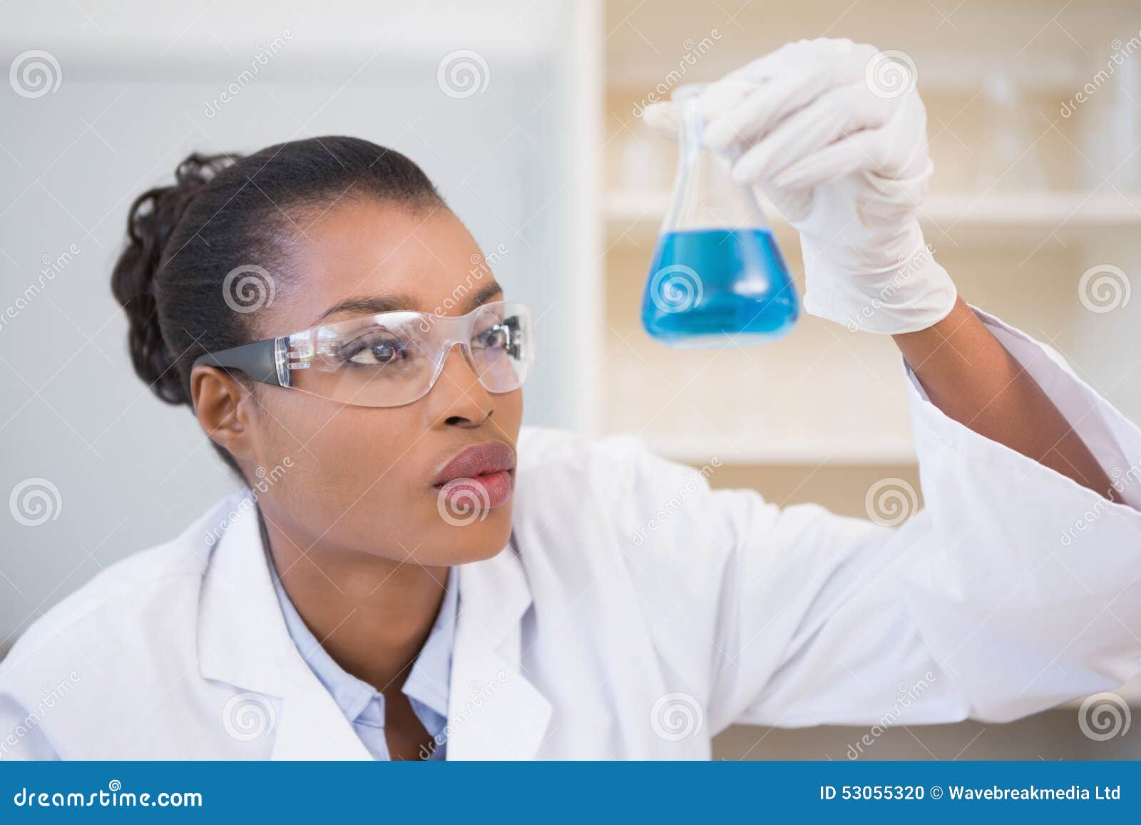Scientist Examining Solution In Petri Dish At Laboratory Royalty-Free ...