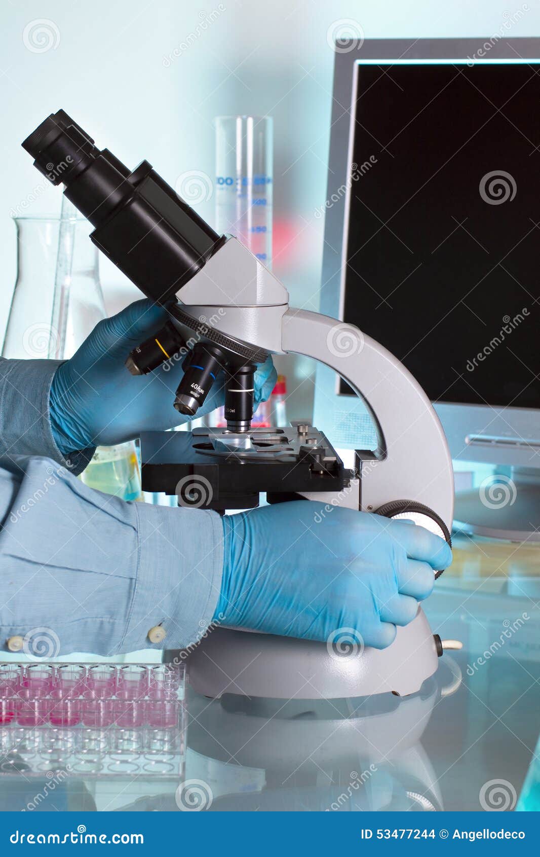 Scientist Examining Samples in the Micro in Analytical Laboratories ...