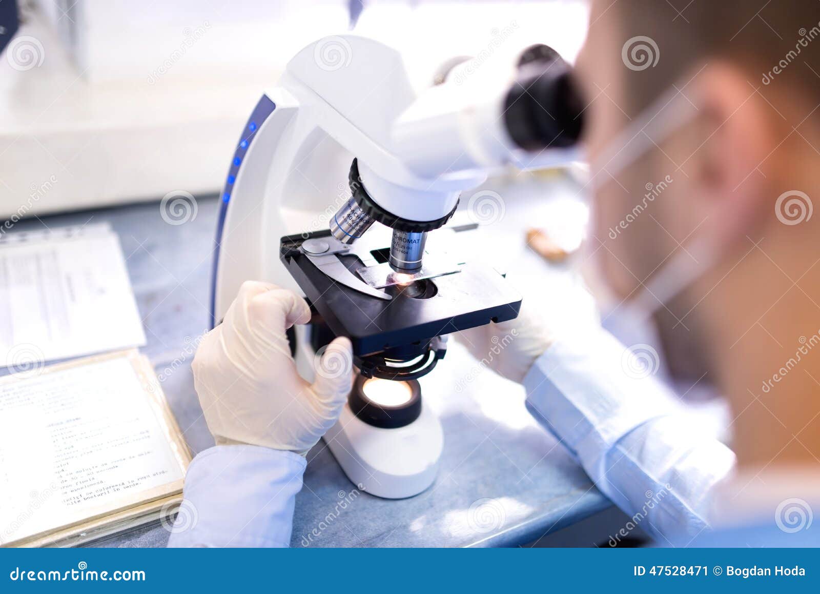 Scientist Examining Samples at Microscope Stock Image - Image of male ...