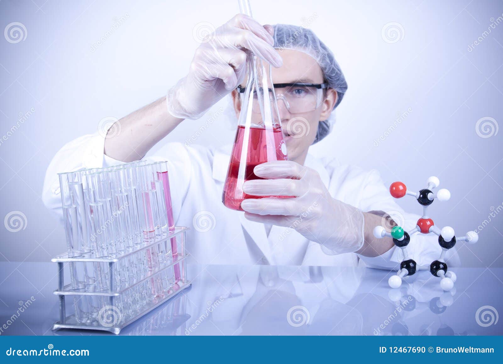 Scientist Experimenting with Fluid Stock Photo - Image of chemical ...