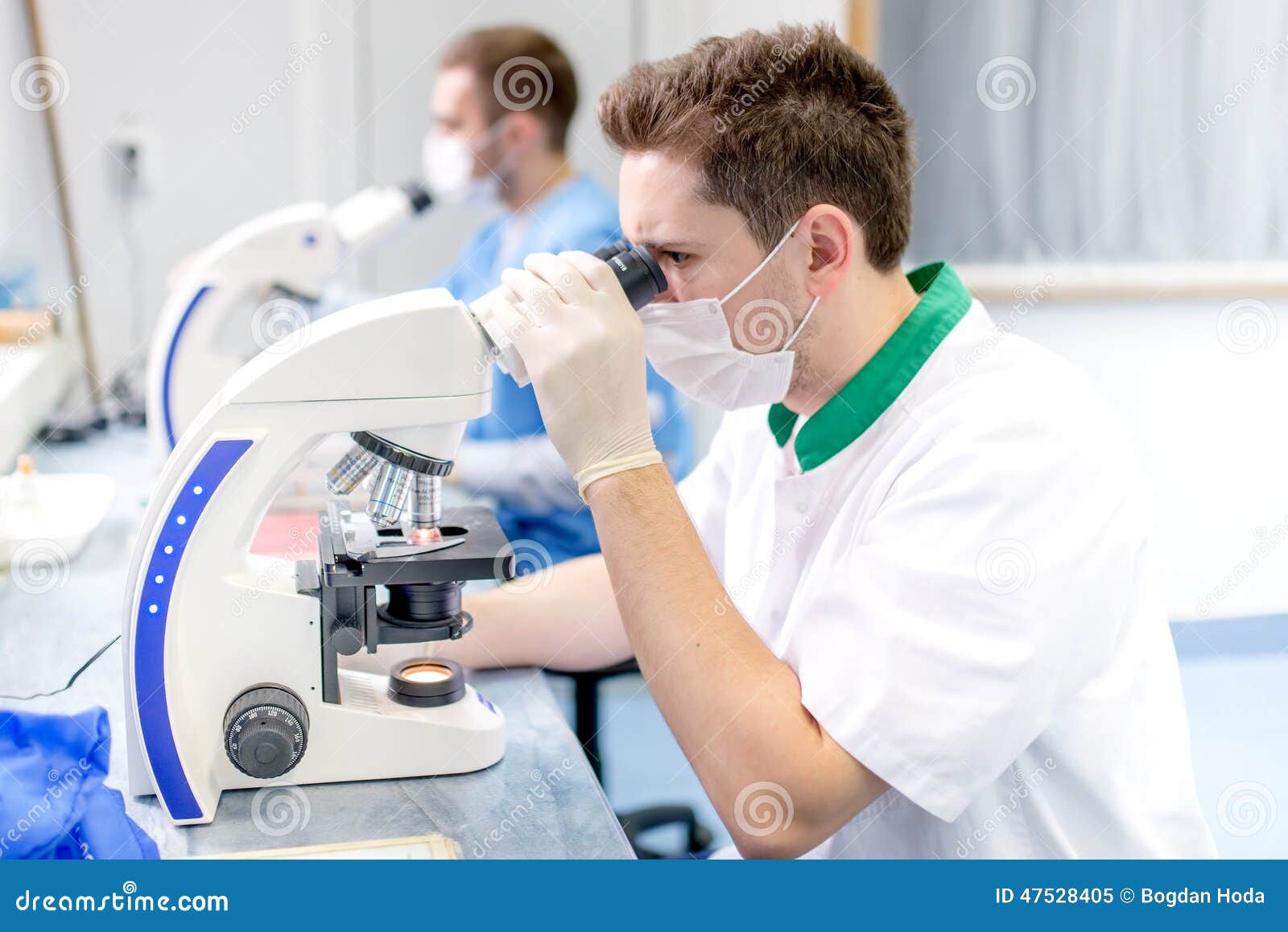 Scientist and Forensic Analyser Working with Microscope Stock Image ...