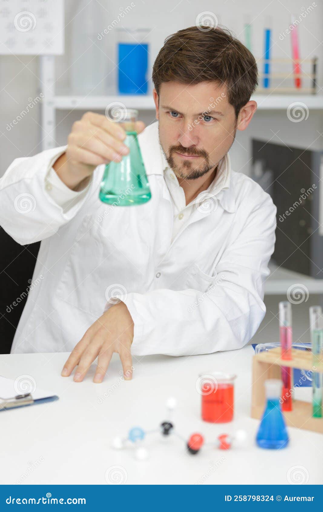 Scientist with Green Liquid in Flask Stock Photo - Image of humor ...