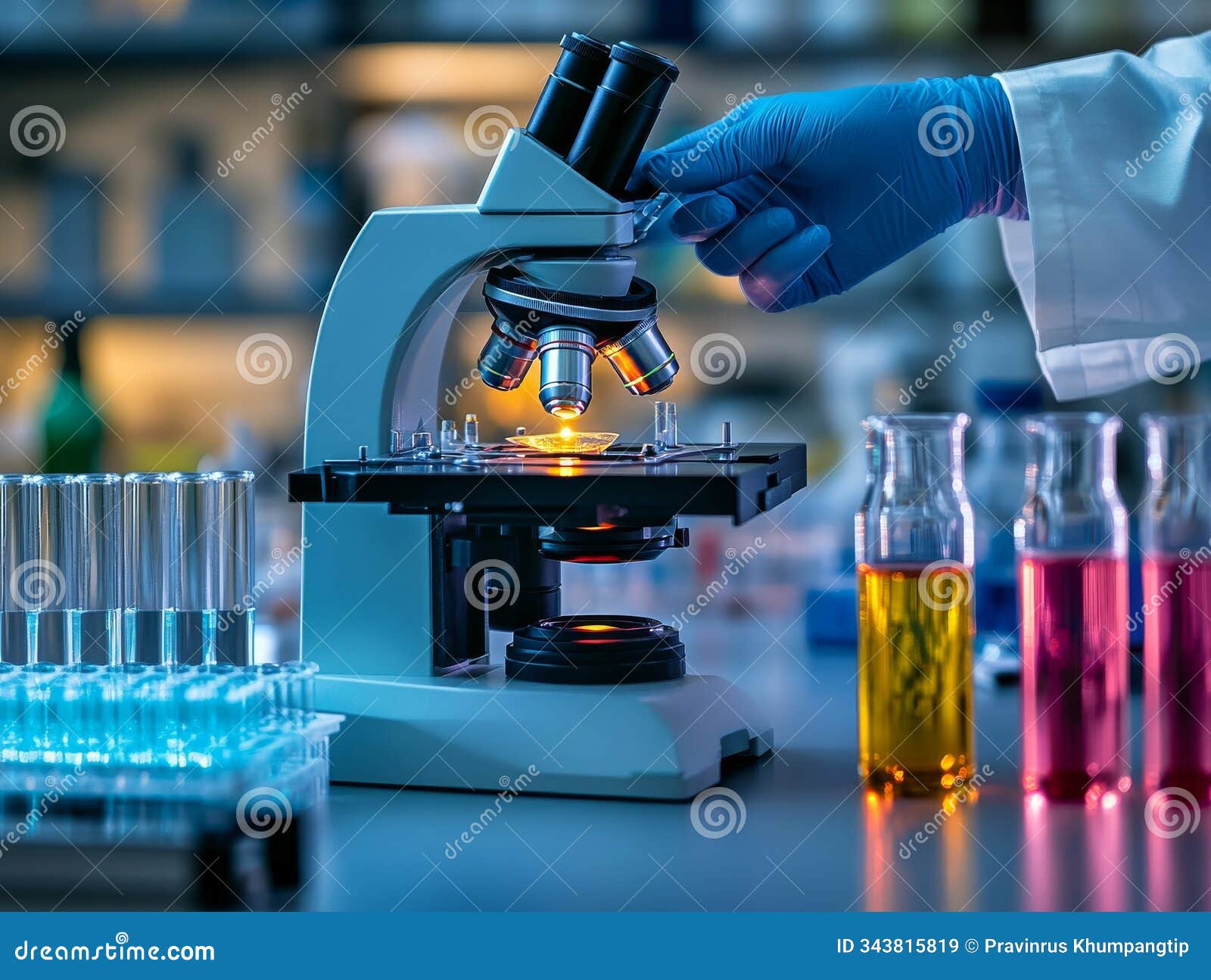 Scientist Hands Placing a Sample Slide Under a Microscope Lens ...