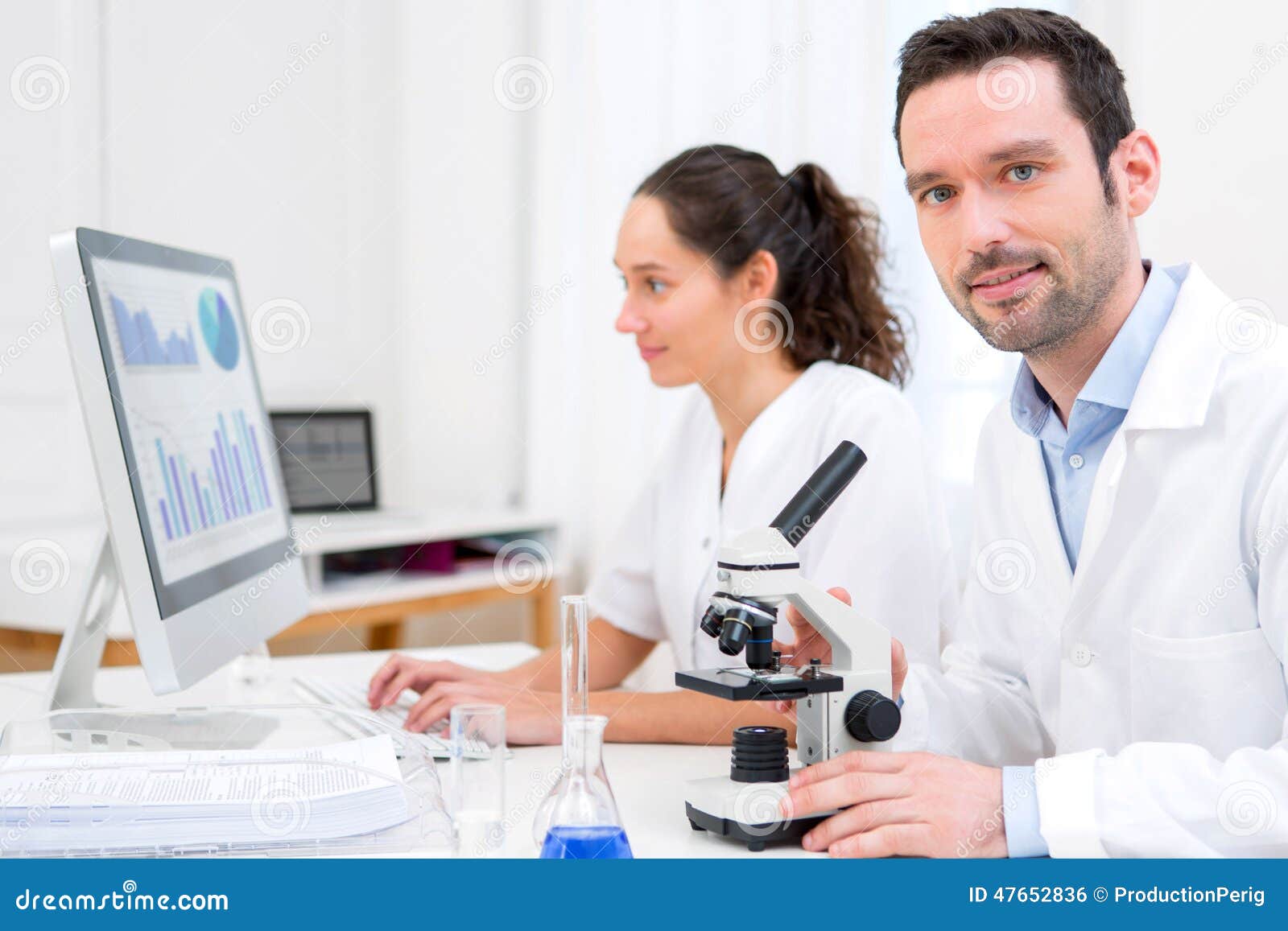 Scientist And Her Assistant In A Laboratory Stock Photo - Image: 47652836