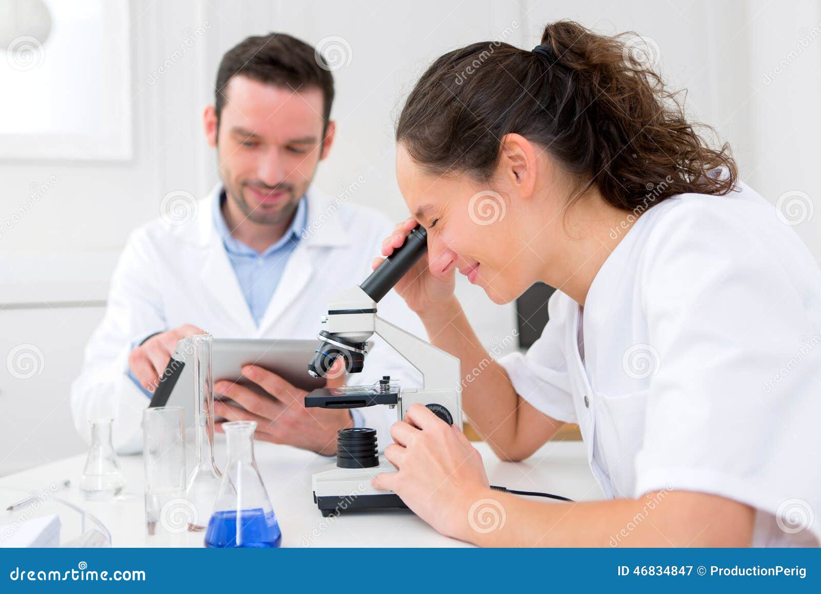 Scientist and His Assistant in a Laboratory Stock Image - Image of ...