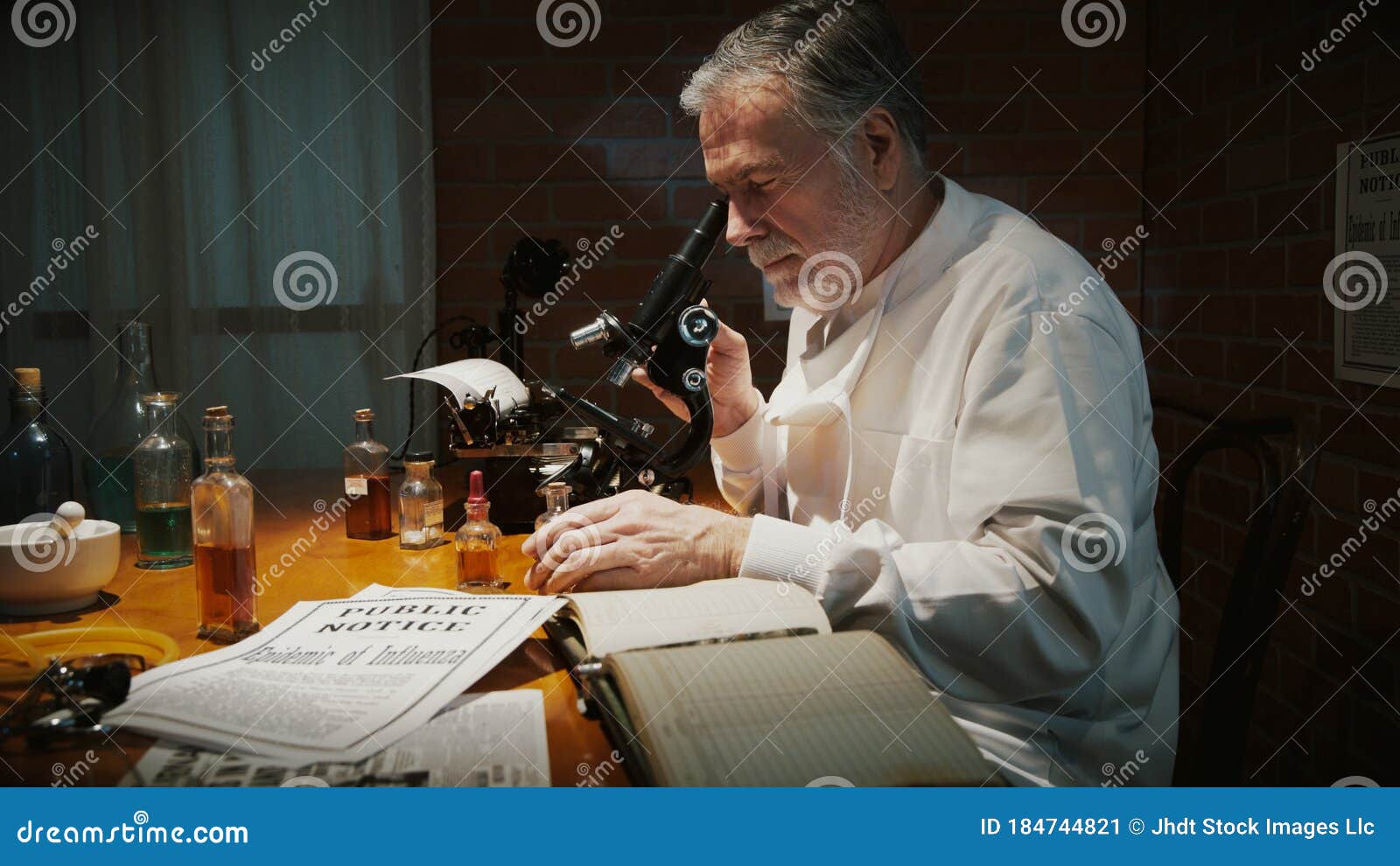 A Scientist in His Laboratory during the 1918 Influenza Pandemic Stock ...