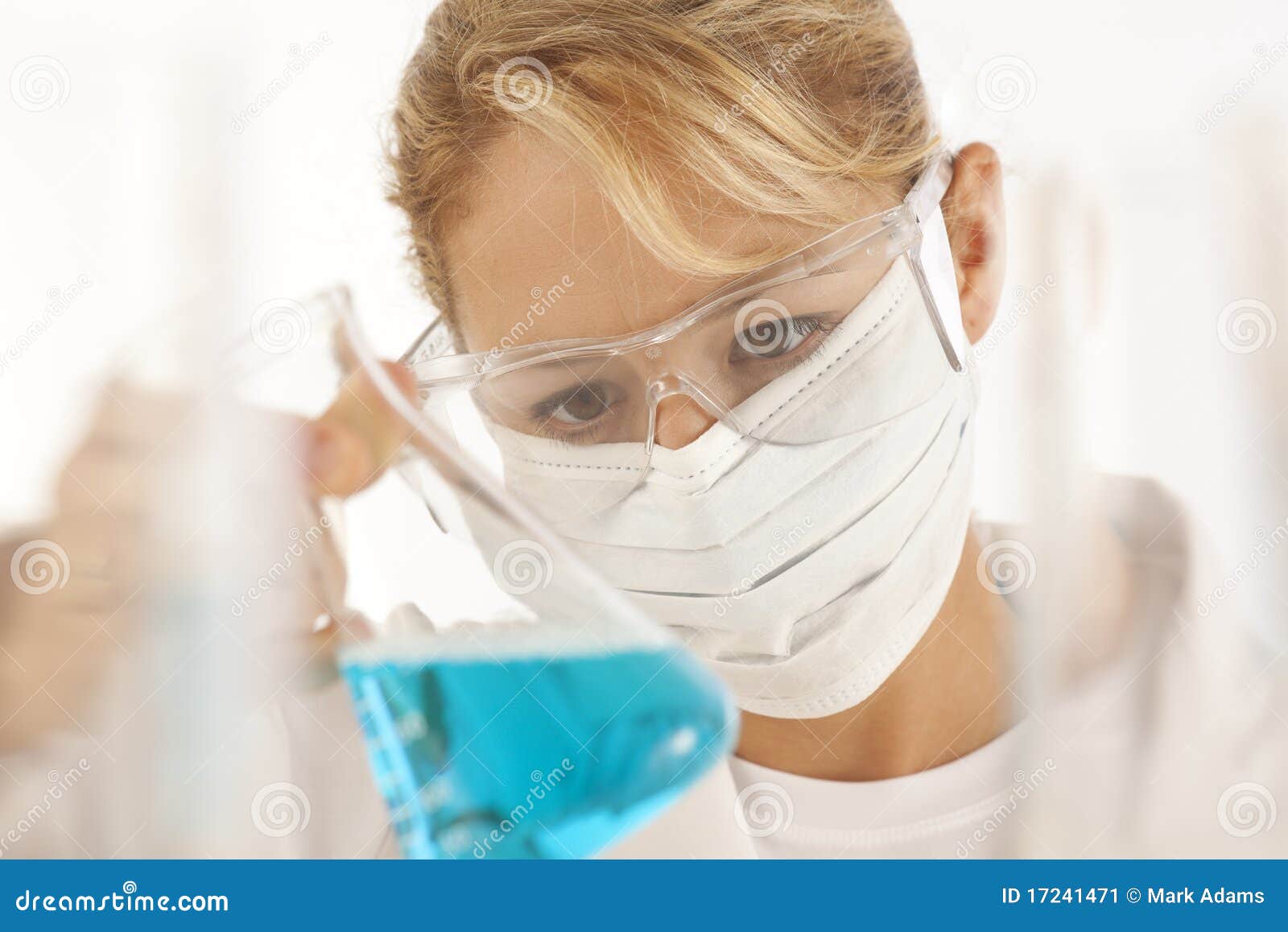 Scientist holding beaker stock image. Image of view, watching - 17241471