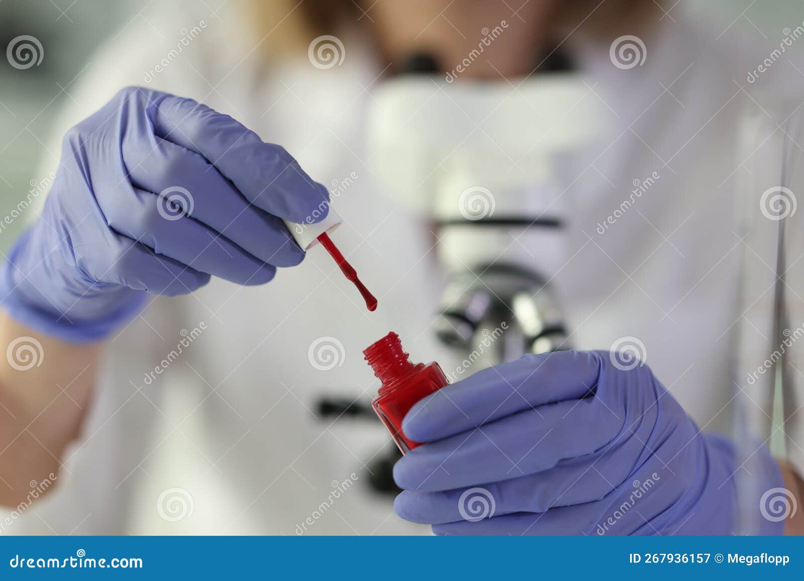 Scientist Holding Bottle with Red Paint and Doing Tests in Laboratory ...