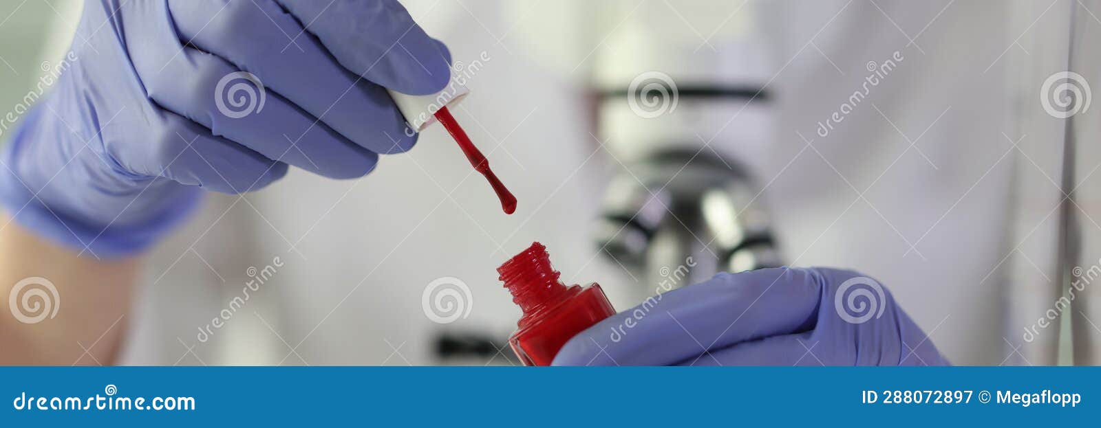 Scientist Holding Bottle with Red Paint and Doing Tests in Laboratory ...