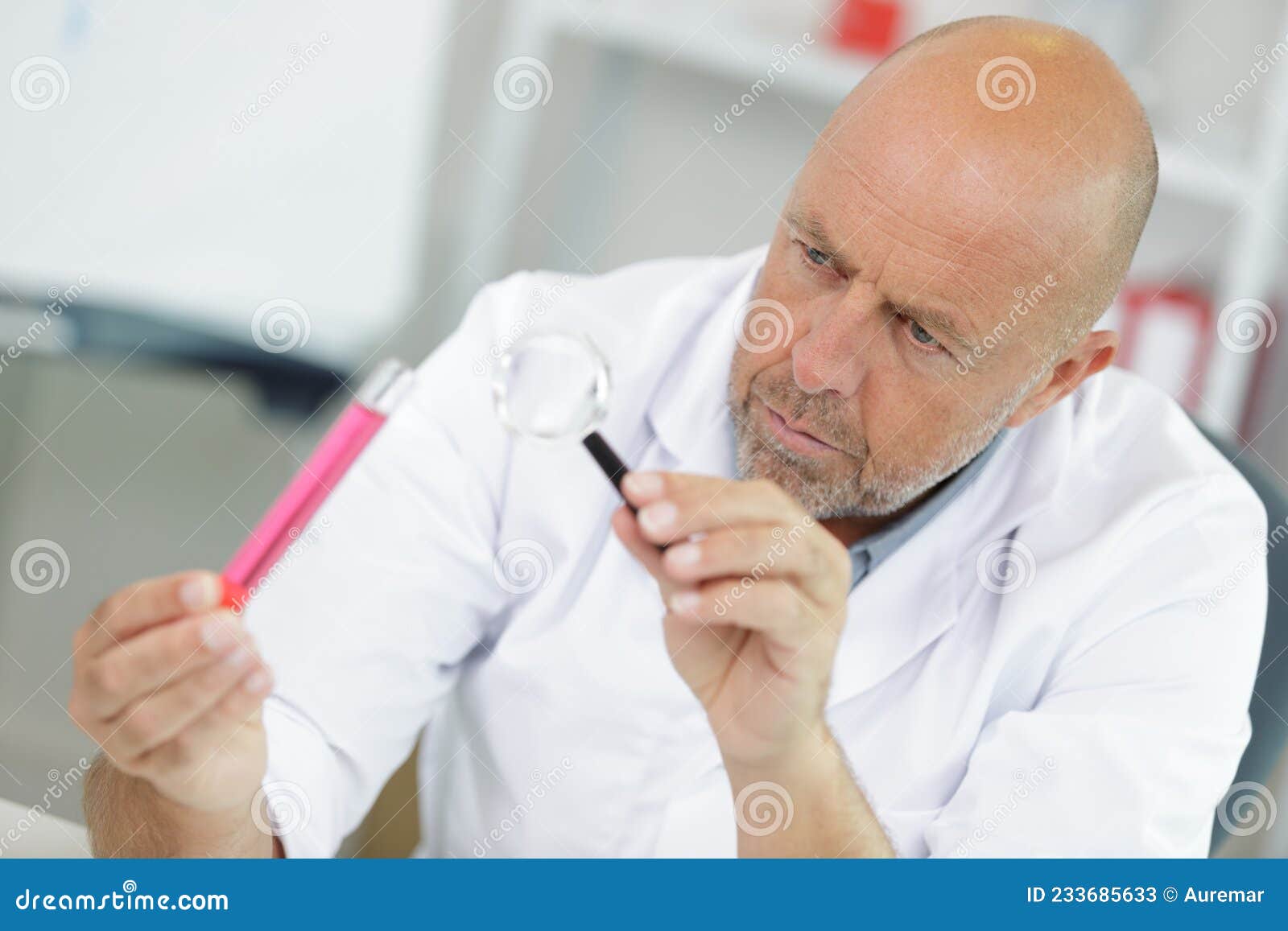Scientist Holding Magnifying Glass at Laboratory Stock Image - Image of ...