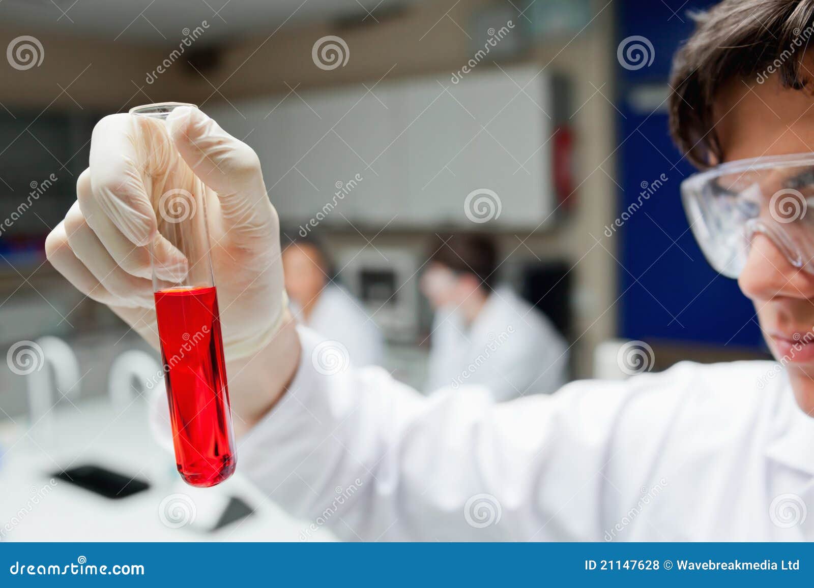 Scientist Holding a Test Tube Stock Photo - Image of handling, hand ...