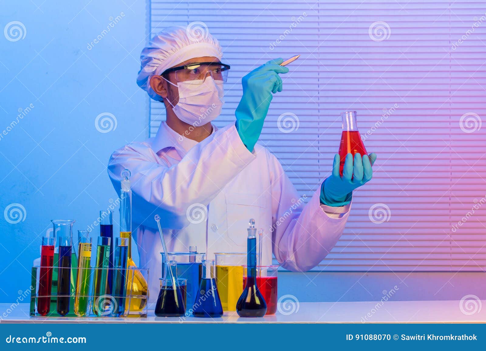 Scientist Holding a Test Tube with Liquid Stock Photo - Image of ...