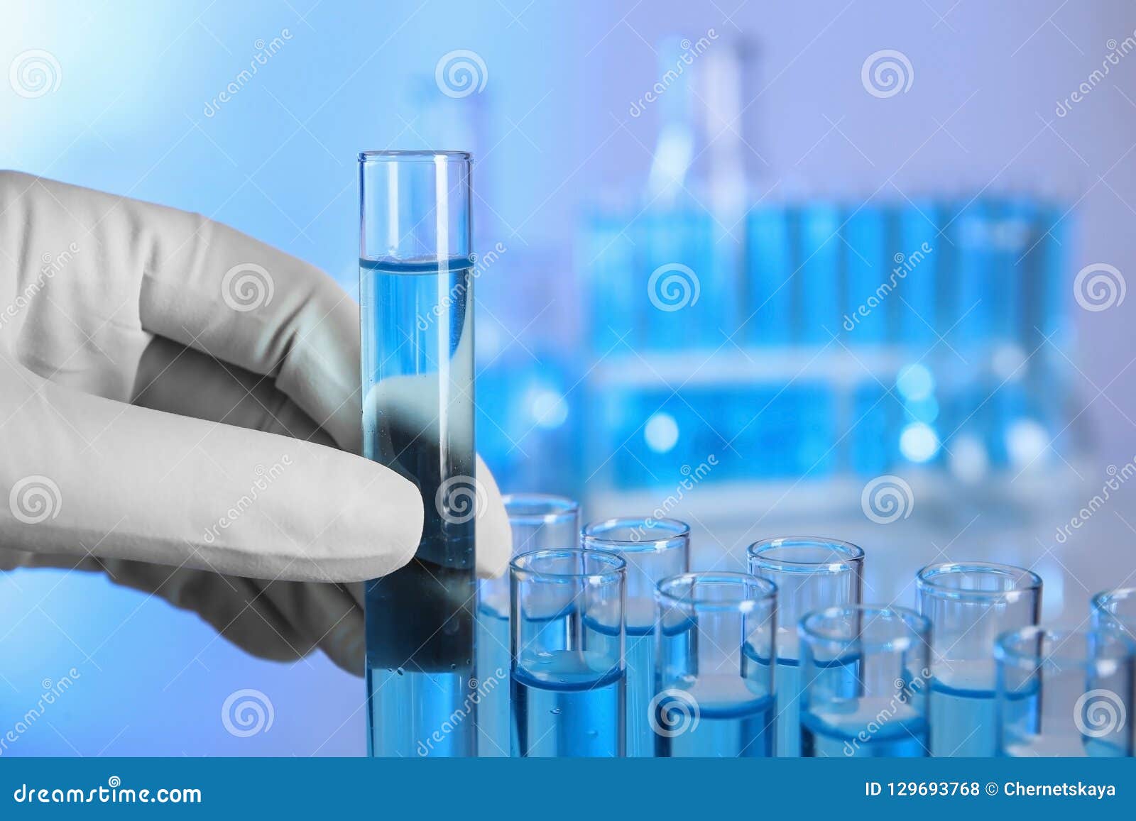 Scientist Holding Test Tube with Sample, Closeup Stock Photo - Image of ...