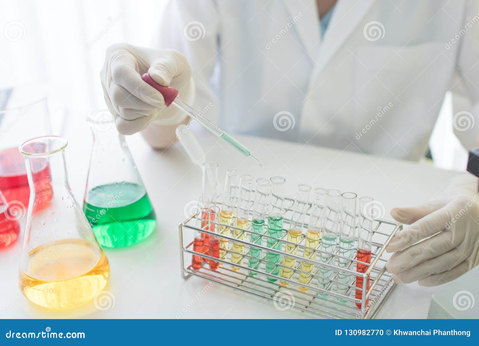 Scientist Holding Test Tube in Science Lap Stock Photo - Image of glove ...