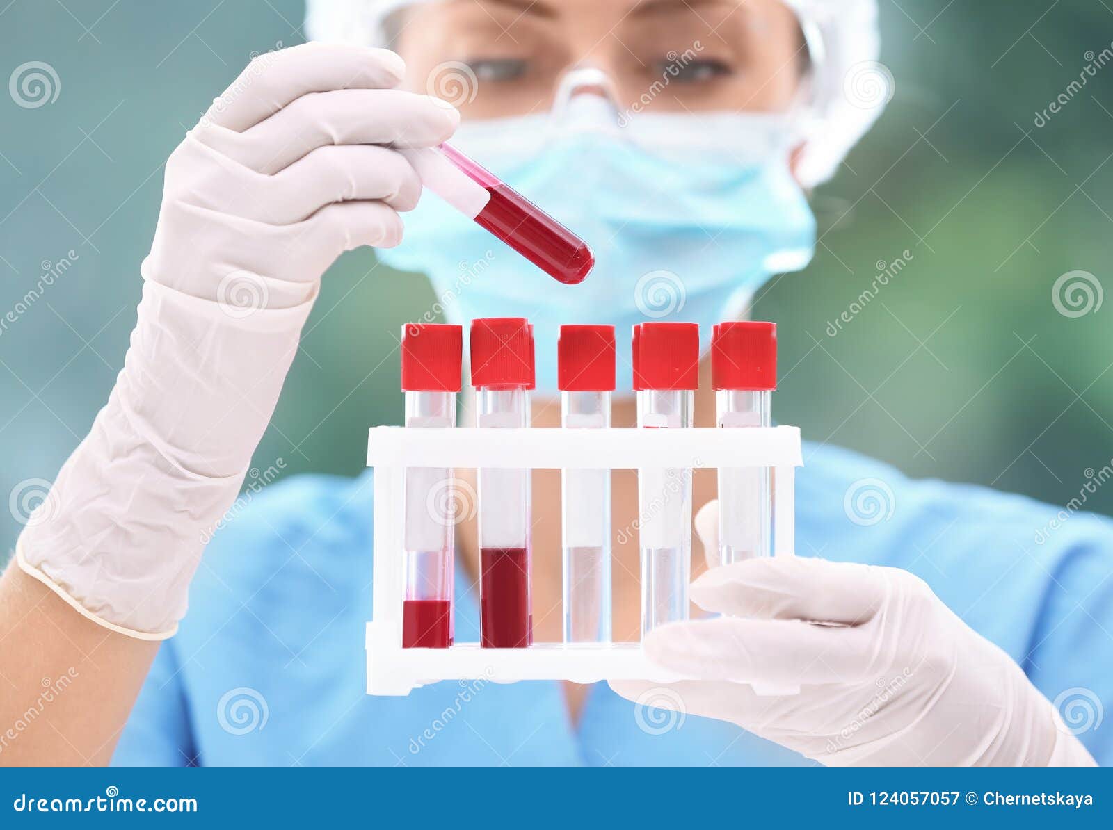Scientist Holding Test Tubes with Blood Samples Stock Image - Image of ...