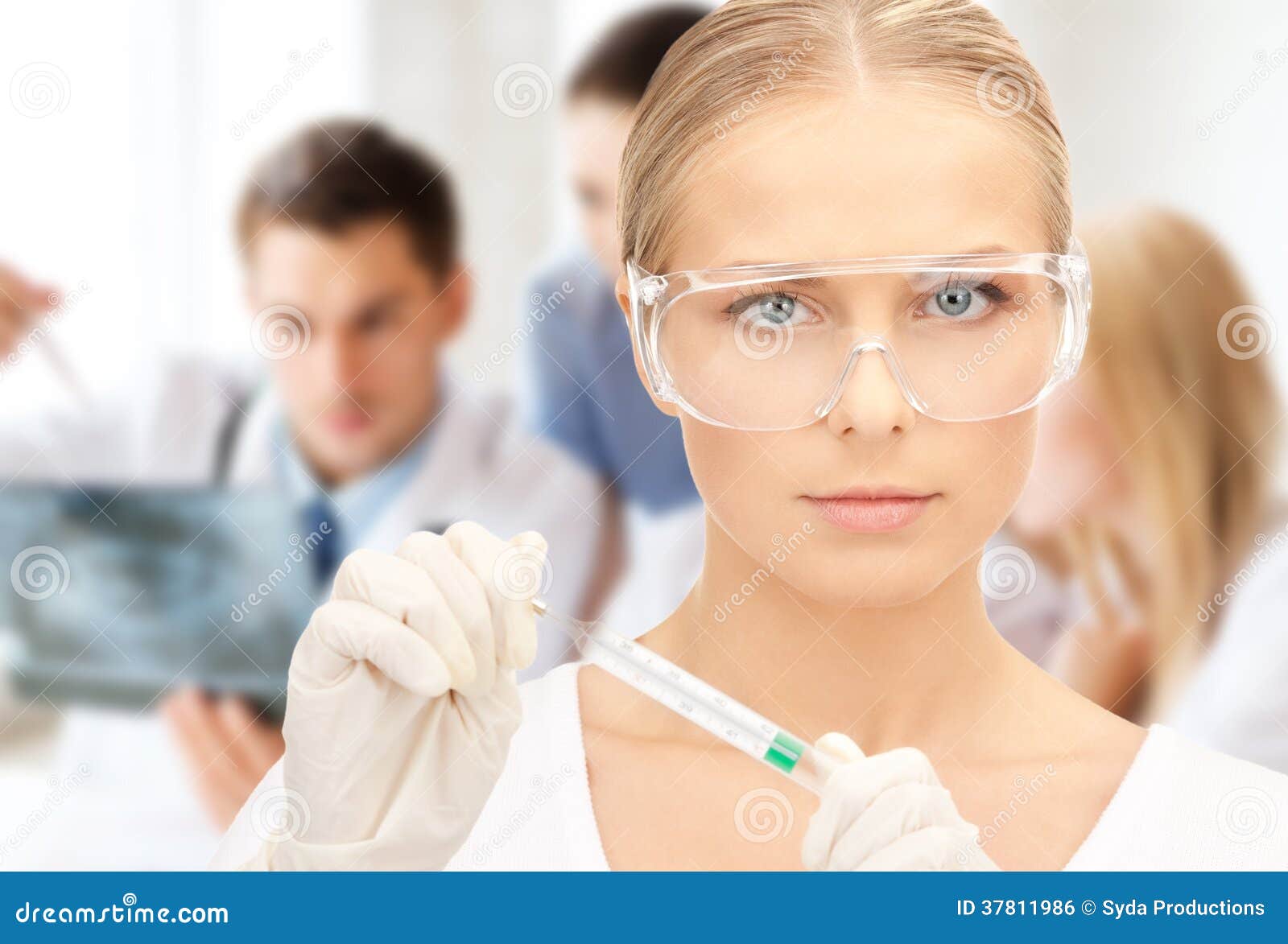 Scientist Holding Thermometer Stock Photo - Image of medic, hospital ...