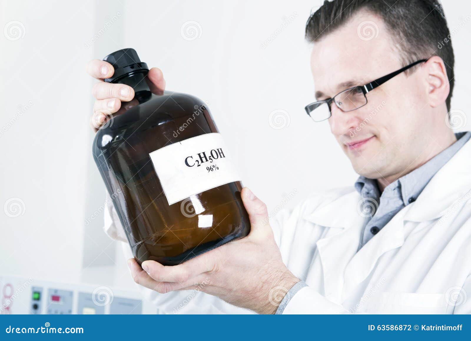 Scientist Holds Bottle in Laboratory Interior. Stock Photo - Image of ...