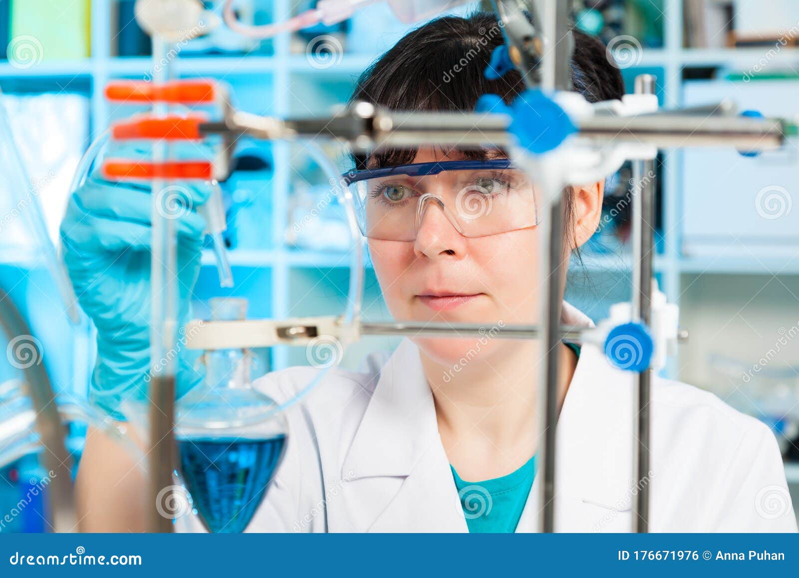 Scientist Holds and Examine Samples in a Laboratory Stock Photo - Image ...