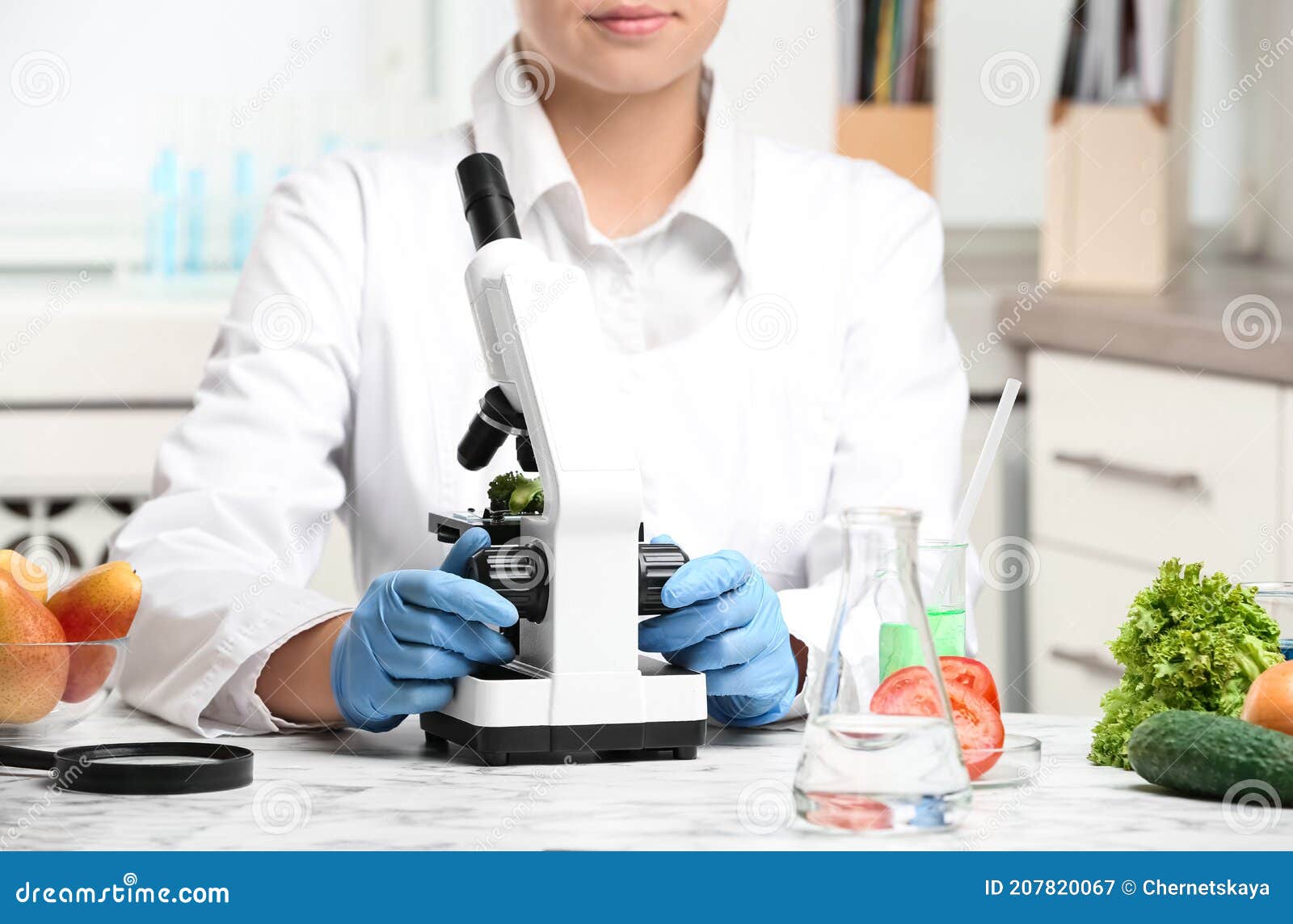 Scientist Inspecting Broccoli with Microscope in Laboratory, Closeup ...