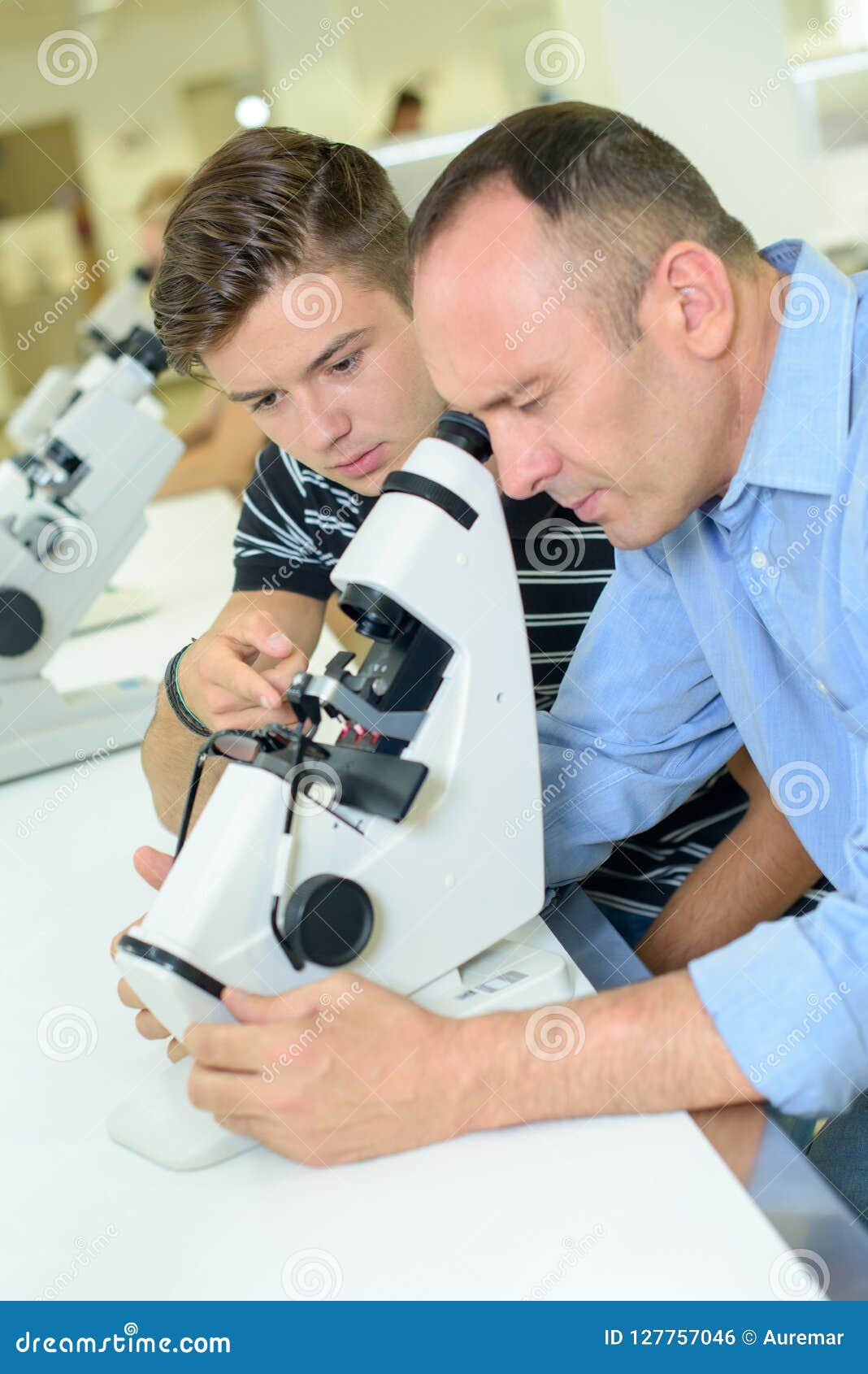 Scientist Inspecting a Material Stock Photo - Image of loupe, biologist ...