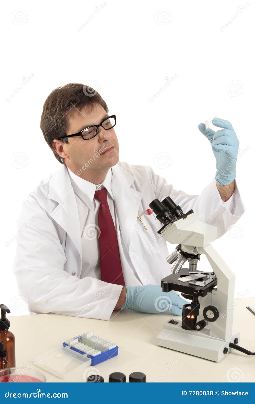 Scientist Inspecting a Slide Stock Photo - Image of magnification ...